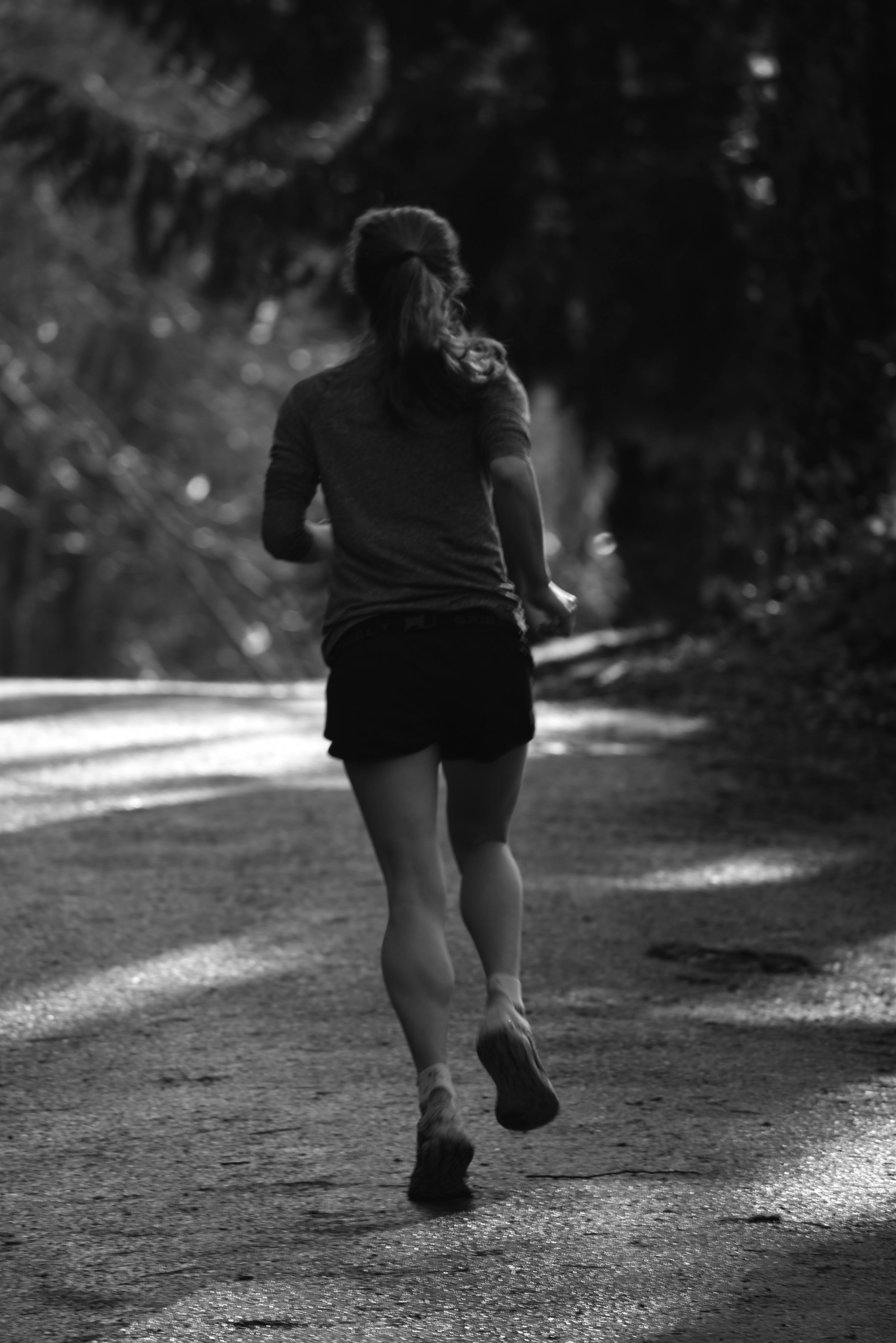 Back View of a Running Woman · Free Stock Photo