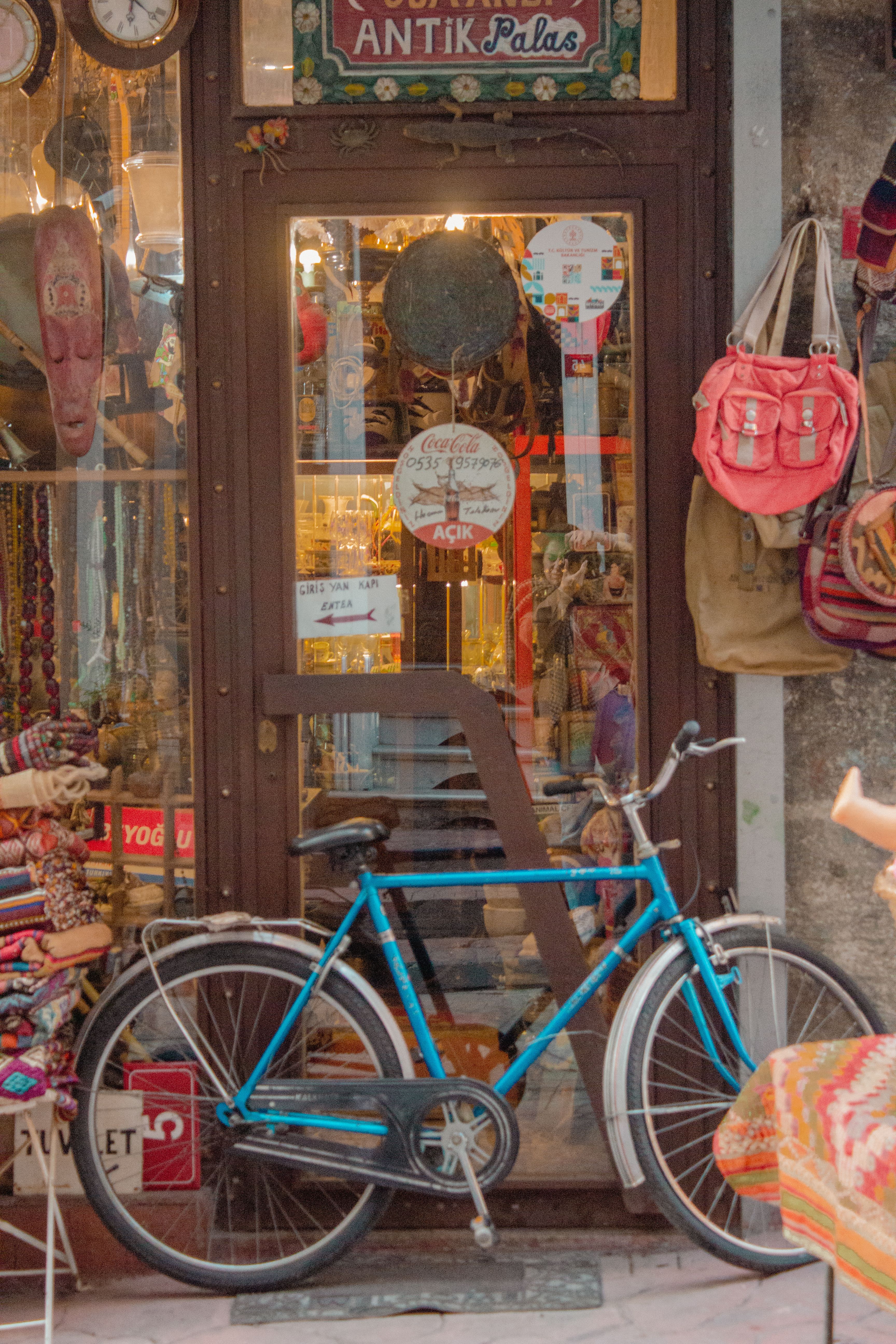 Blue Retro Bike at the Store · Free Stock Photo