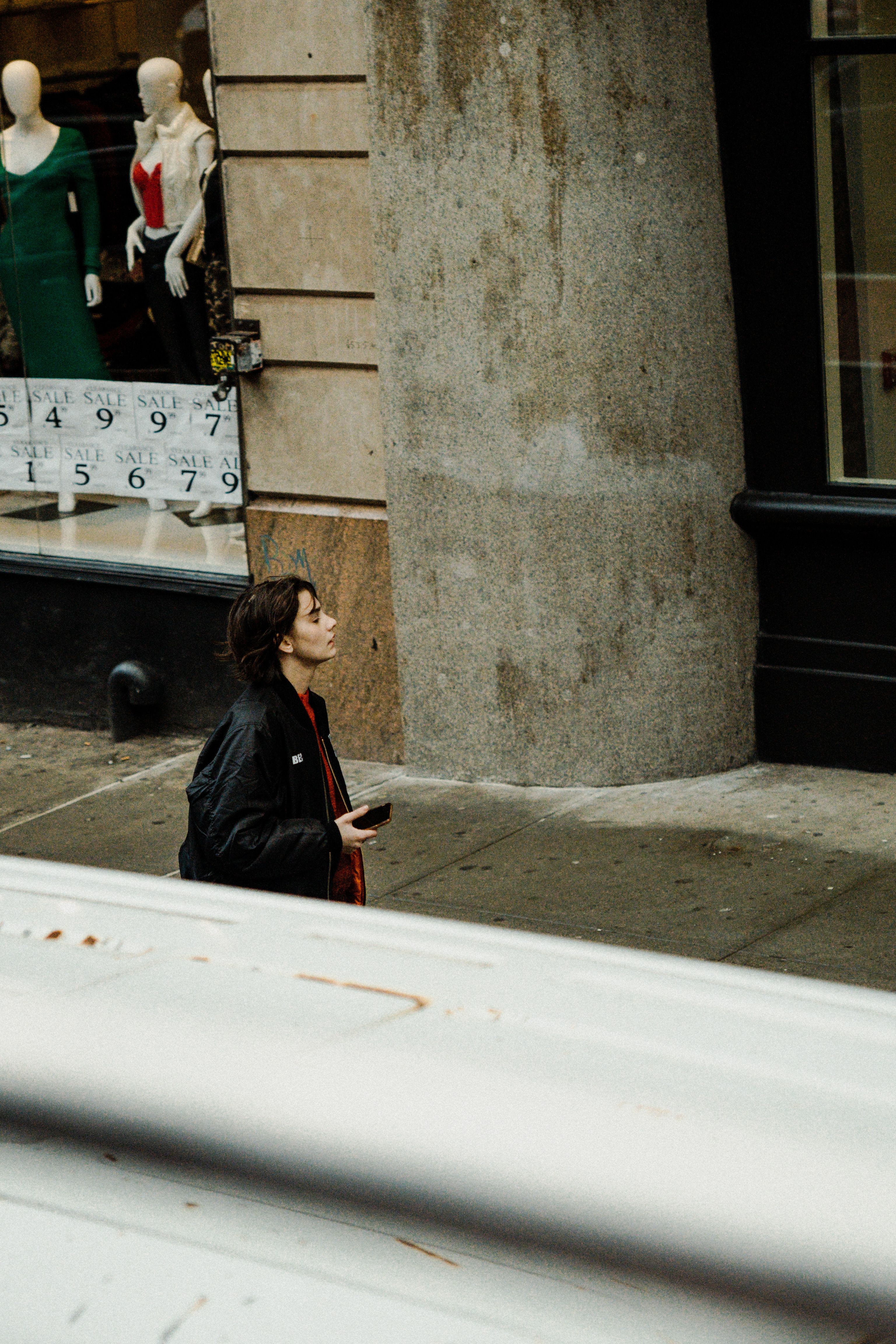 Man Walking on City Street · Free Stock Photo