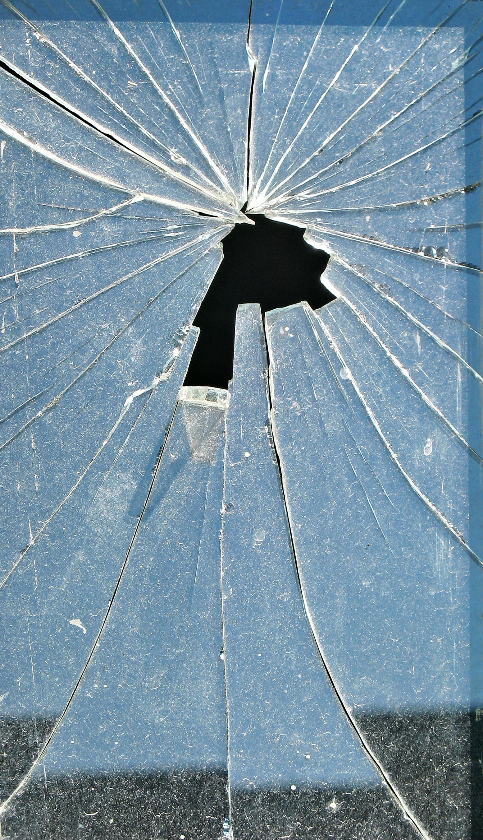 Hole in Broken Glass · Free Stock Photo