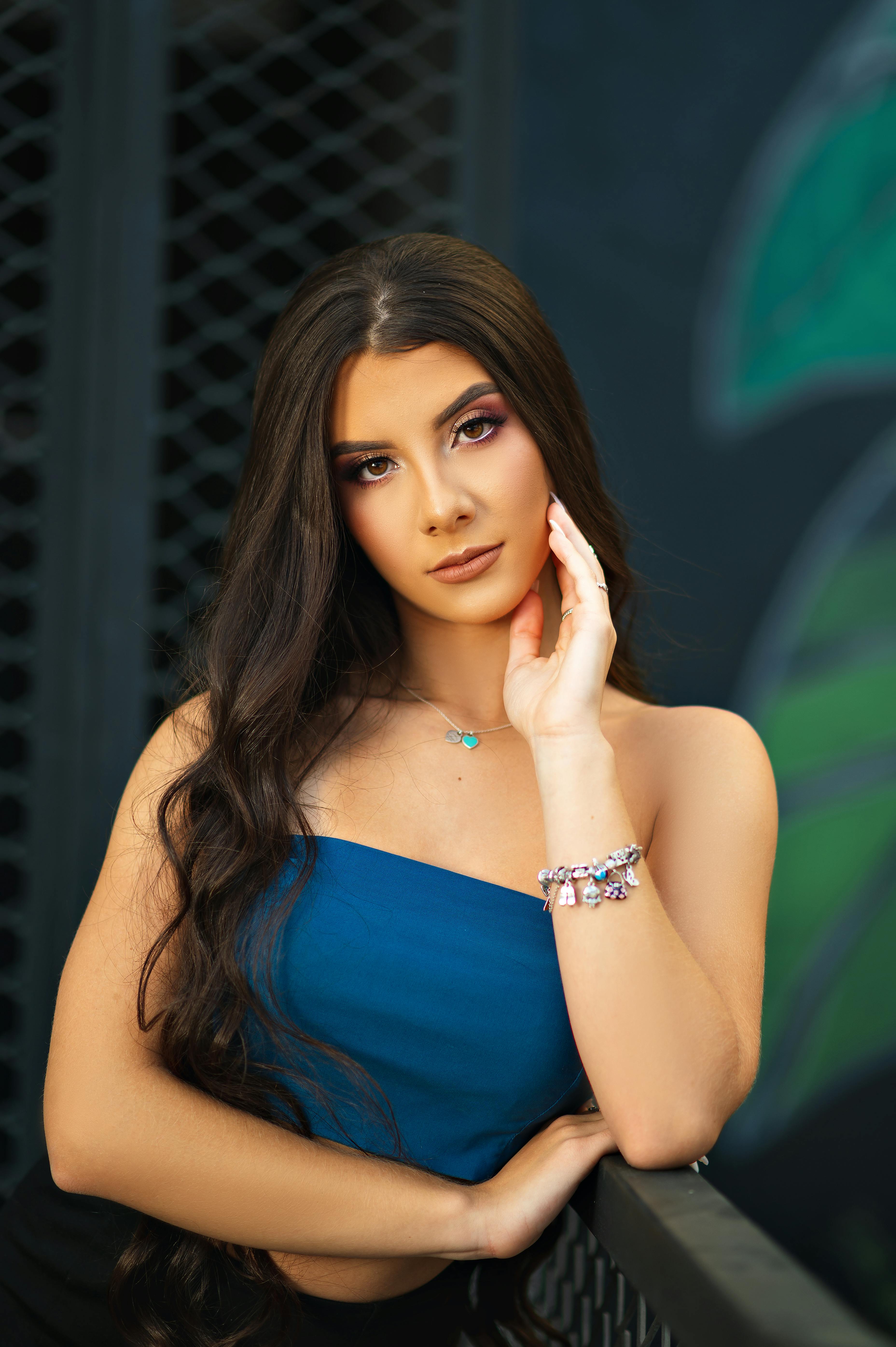 Woman in Black Dress Photo Session on Blue Studio Background · Free ...