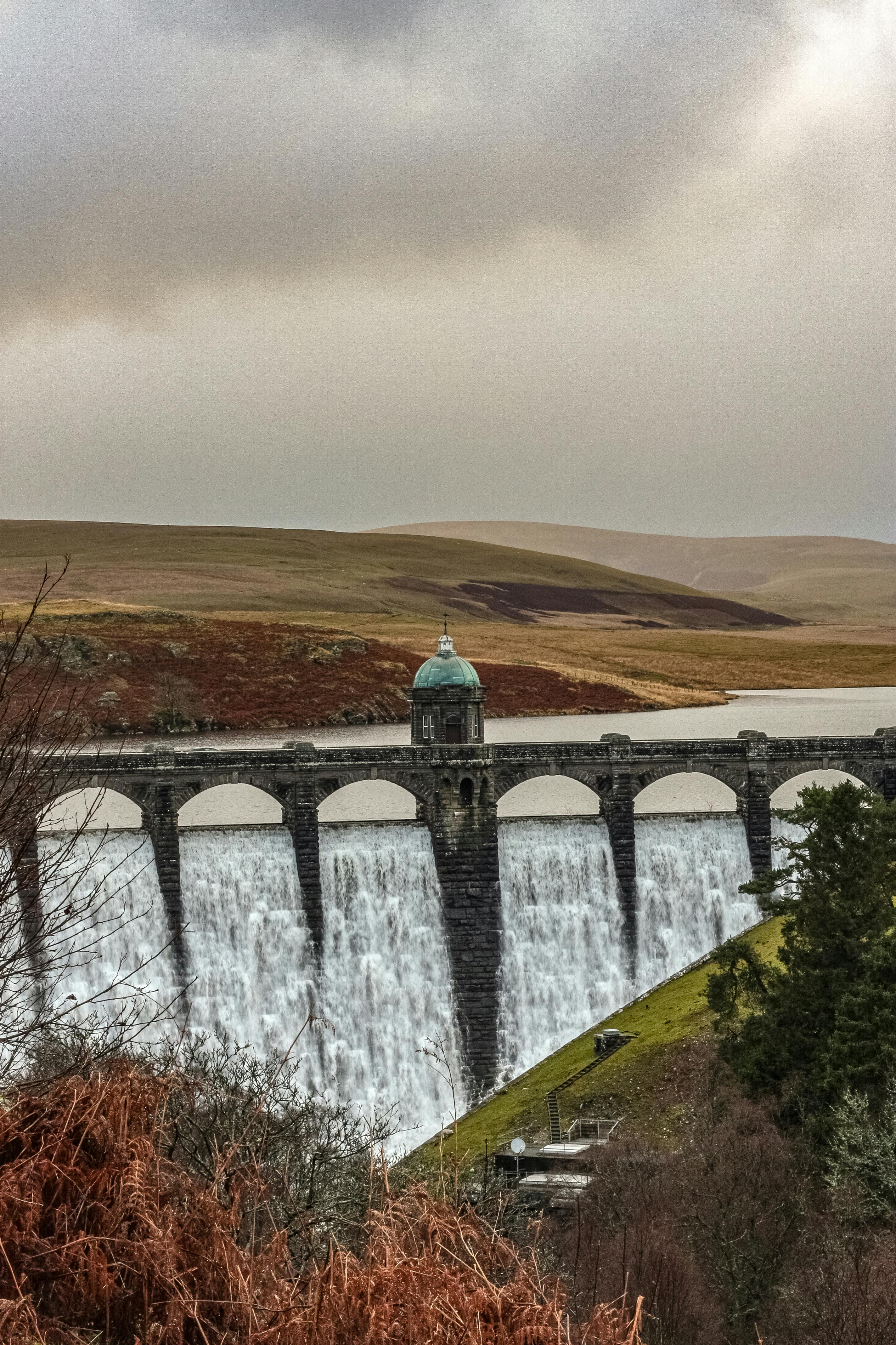 Stone Bridge Built over Dam · Free Stock Photo