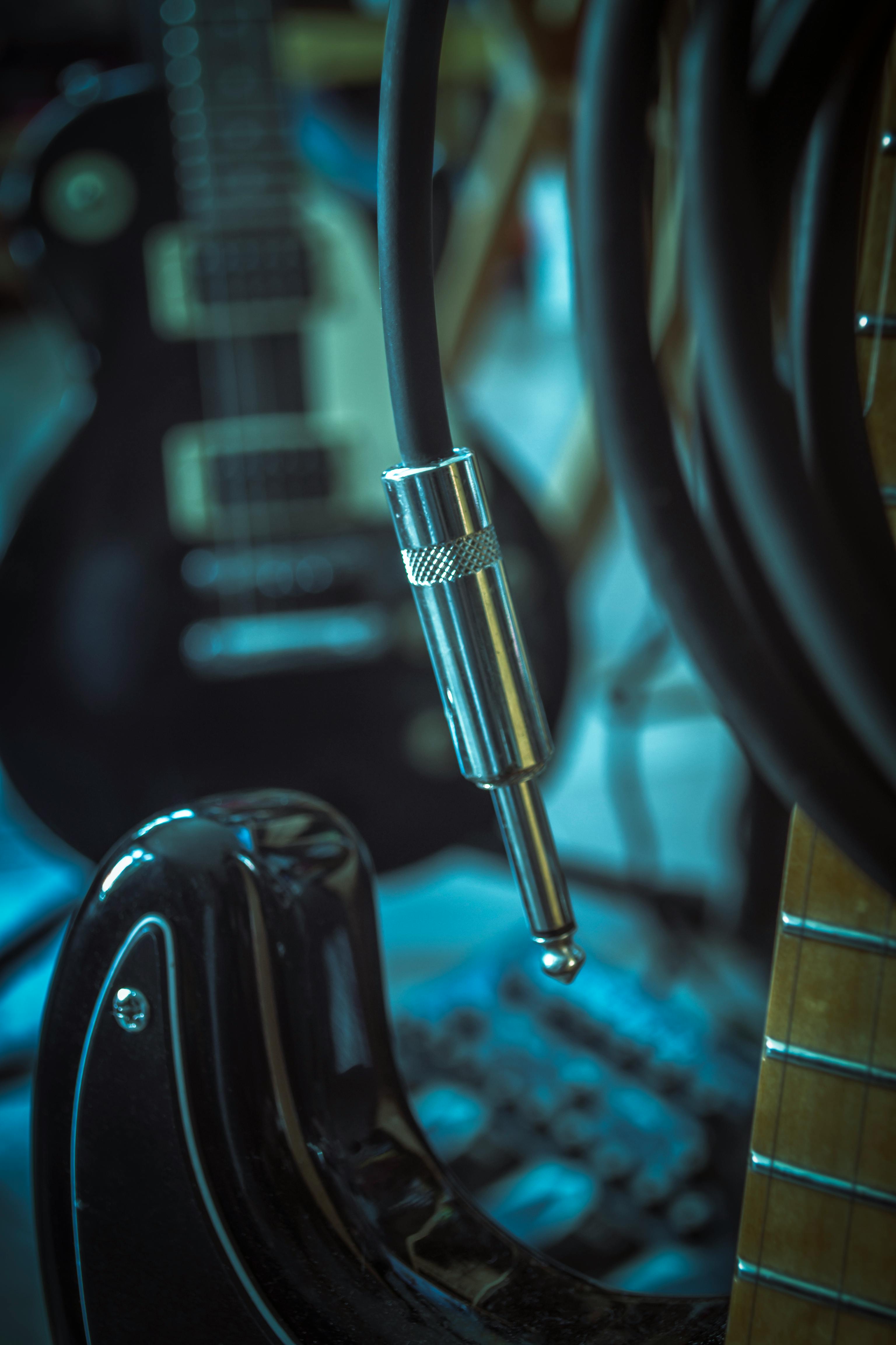 Mono Jack Plug of Instrument Cable Hanging on the Neck of an Electric ...