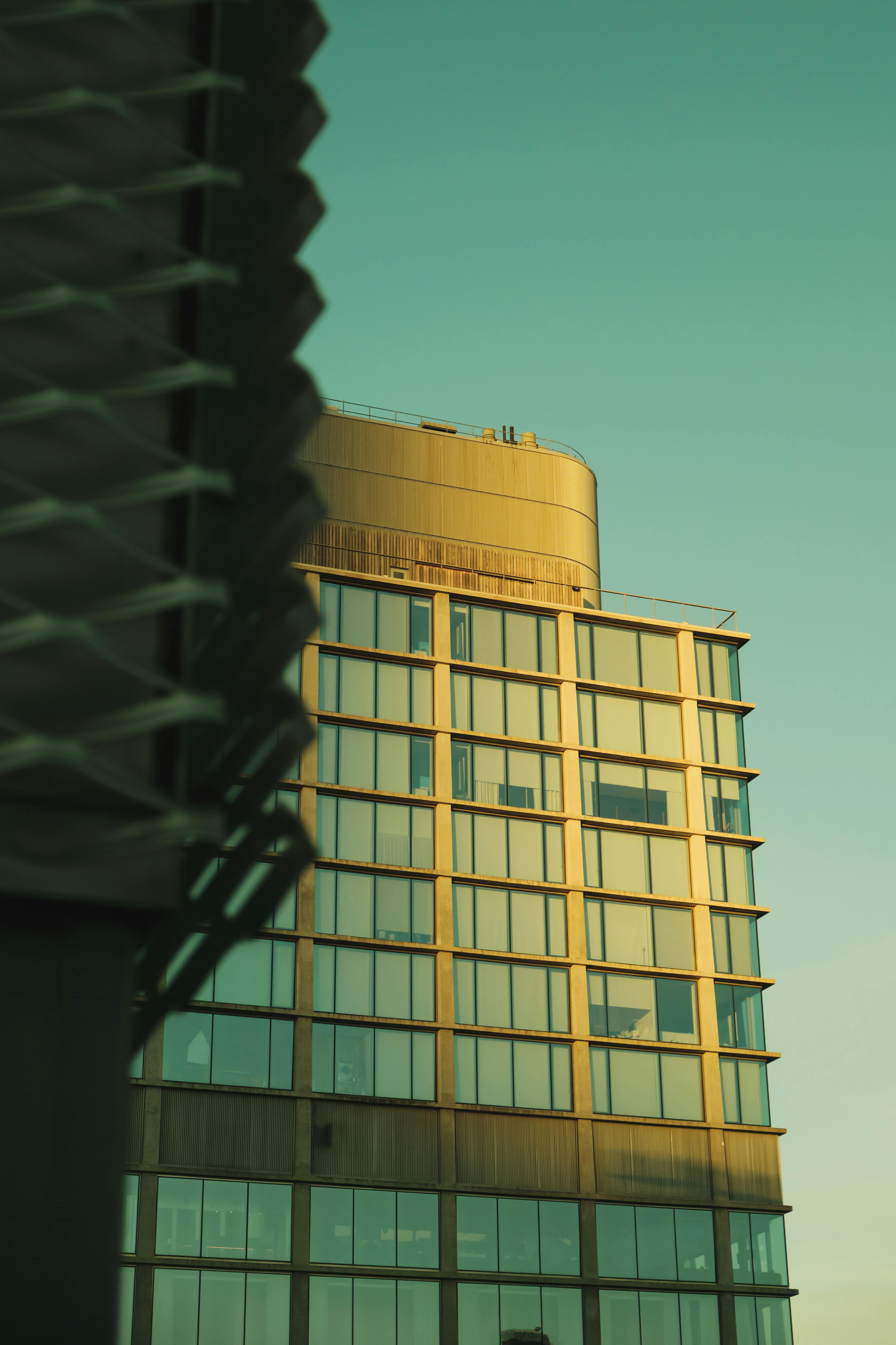 Buildings in City Against Blue Sky · Free Stock Photo