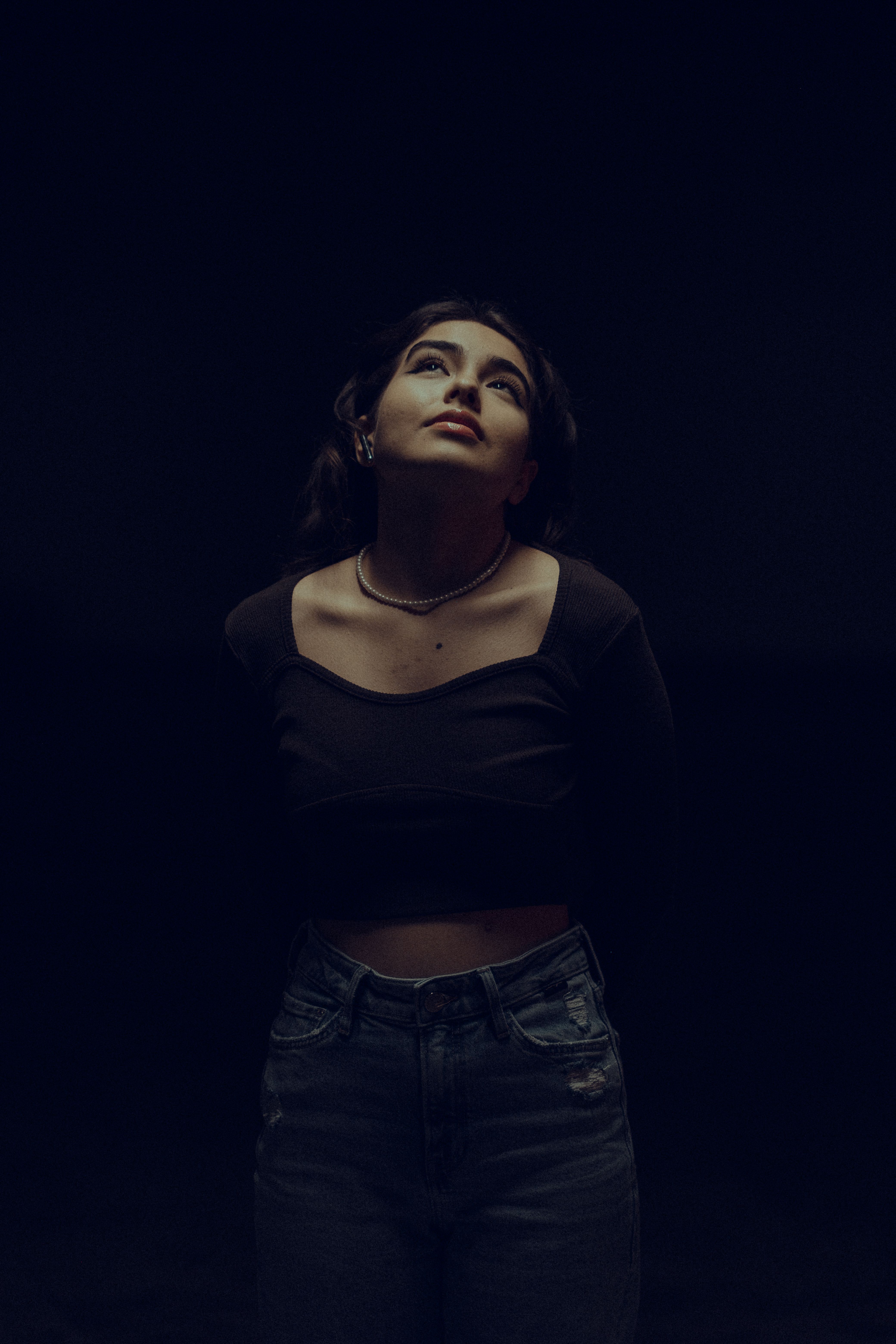 Woman on Black Background · Free Stock Photo