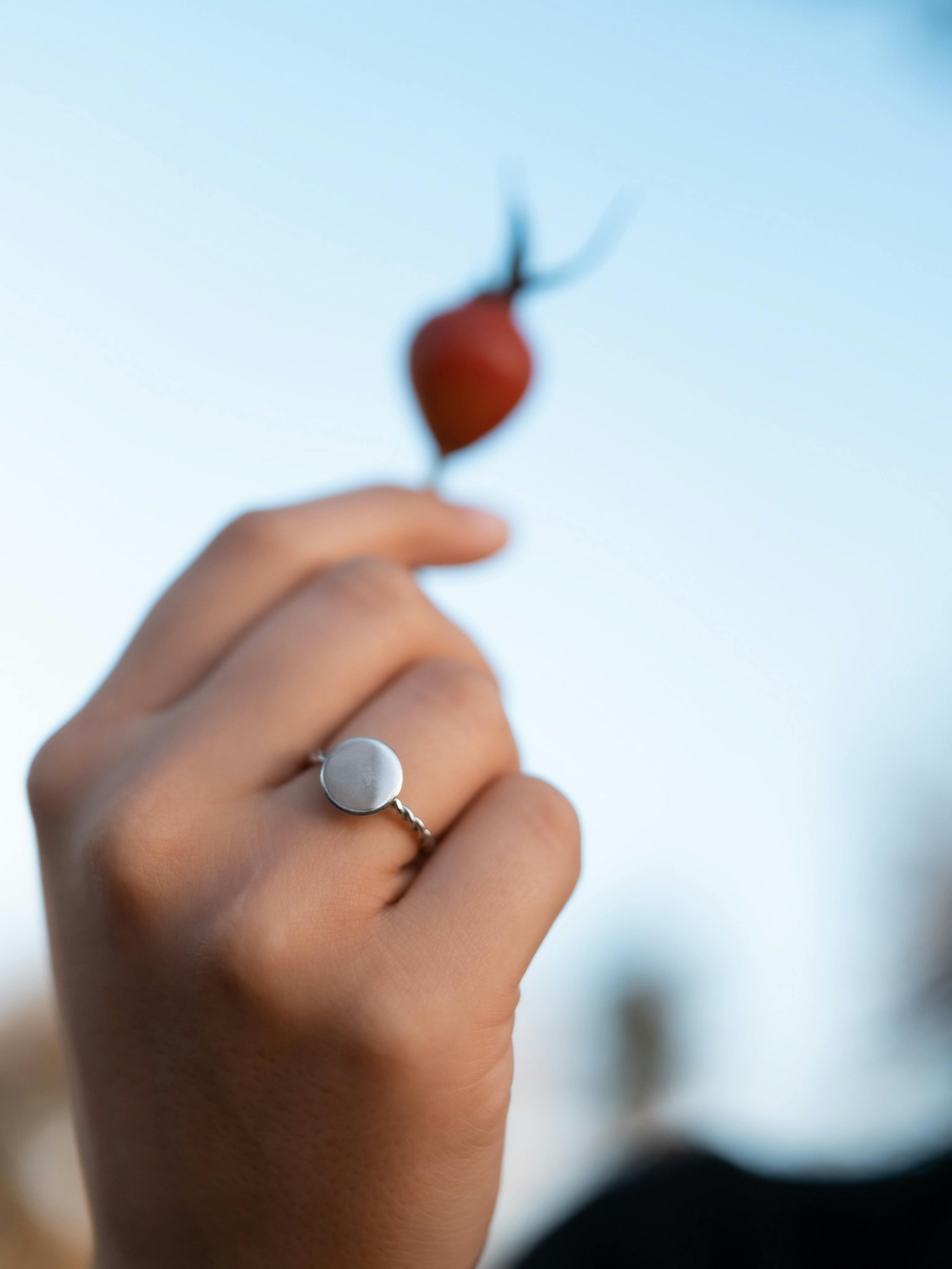 A Person Wearing Silver Ring · Free Stock Photo