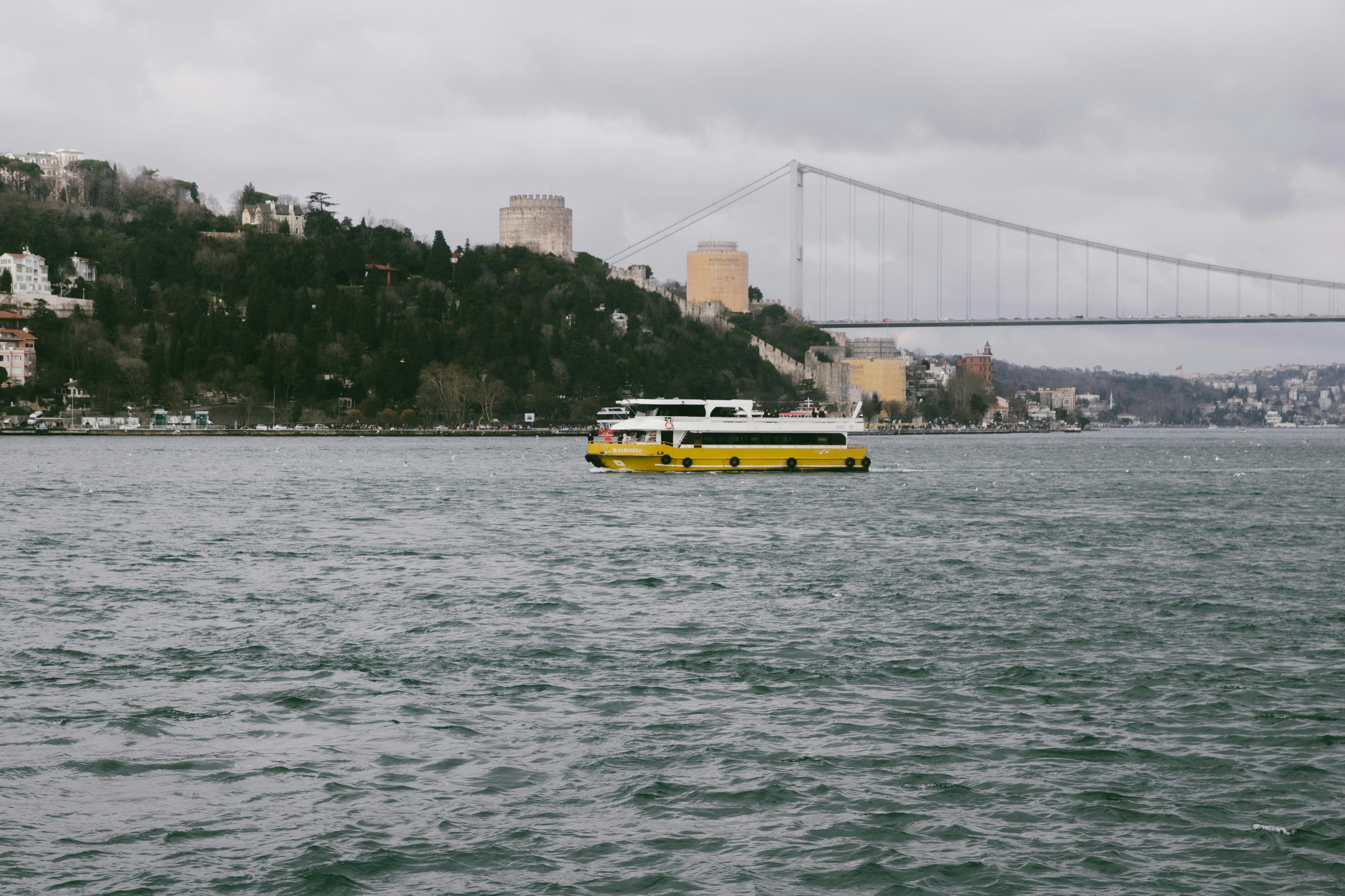 White and Yellow Ship on the Body of Water · Free Stock Photo