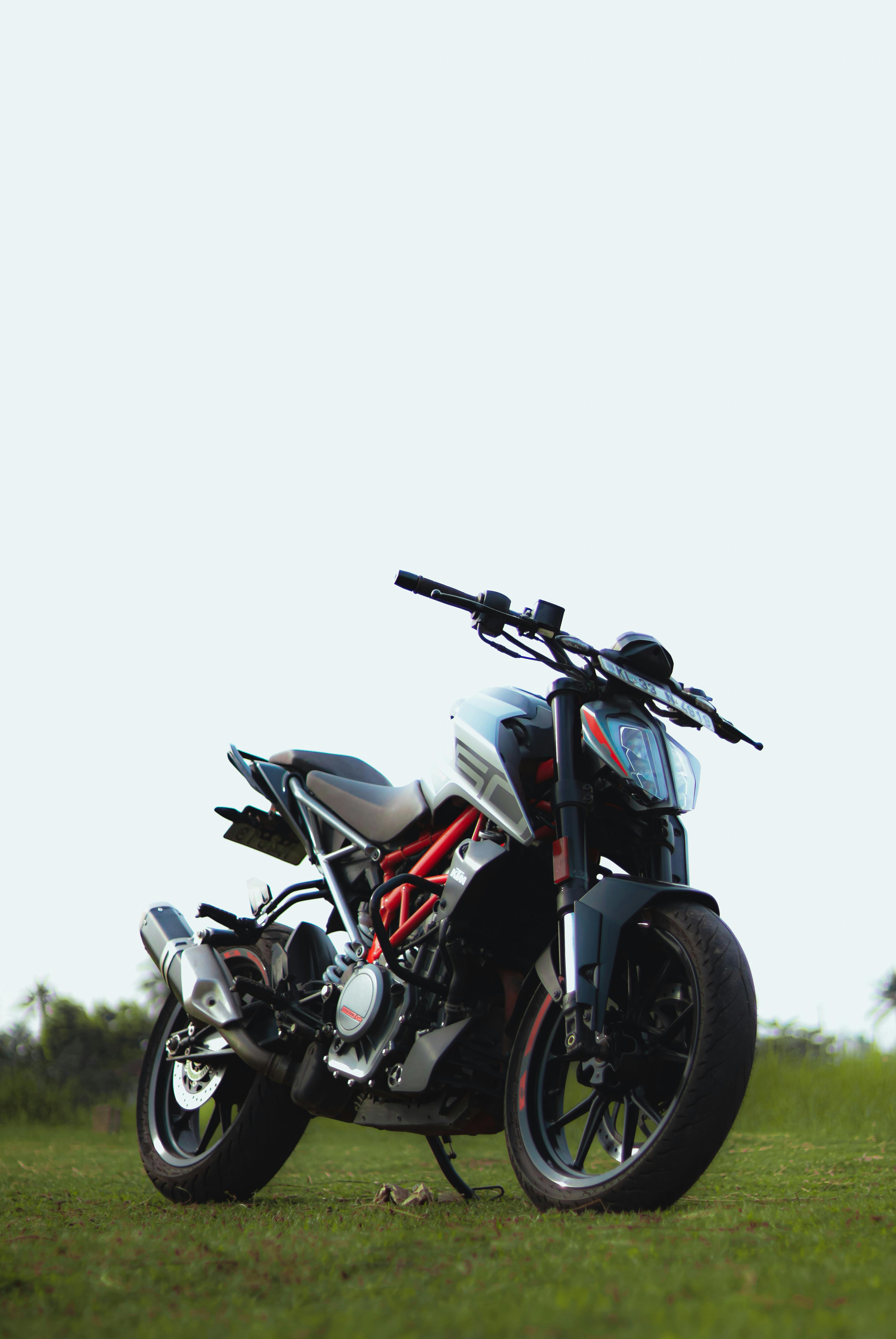 A Motorcycle Parked Near a Patio · Free Stock Photo