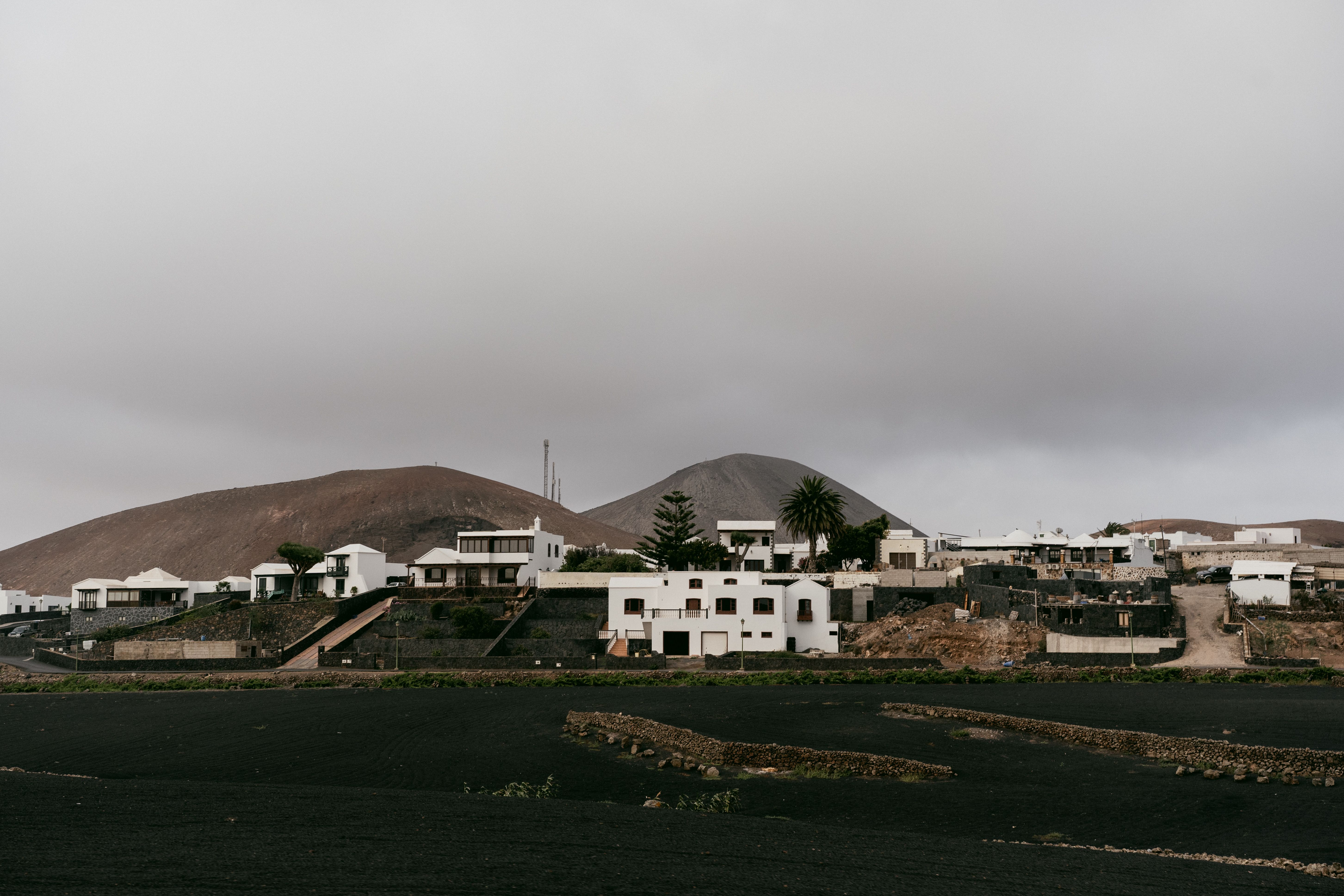 Photo of a Town against an Overcast Sky · Free Stock Photo