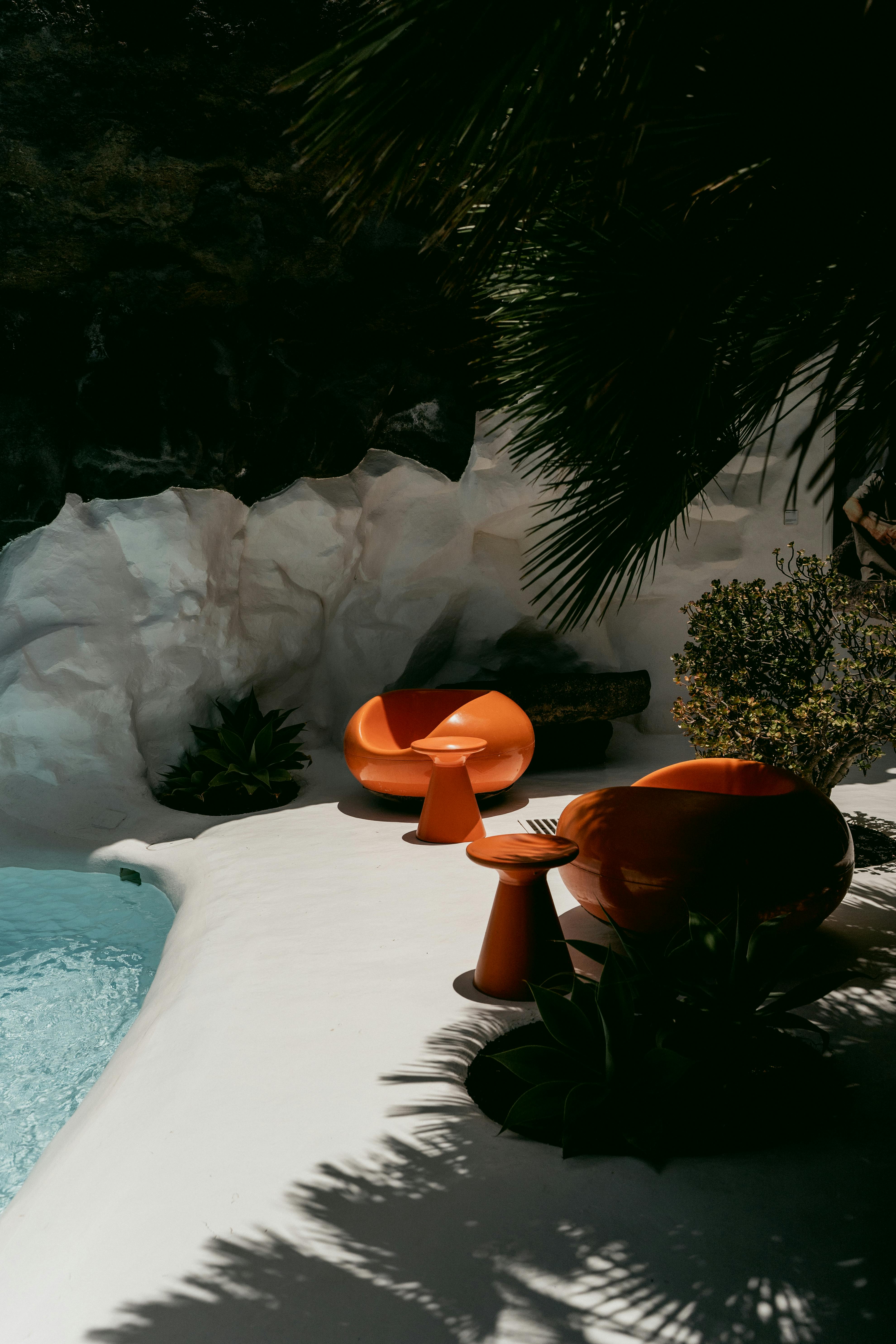 Orange Seats by the Swimming Pool · Free Stock Photo