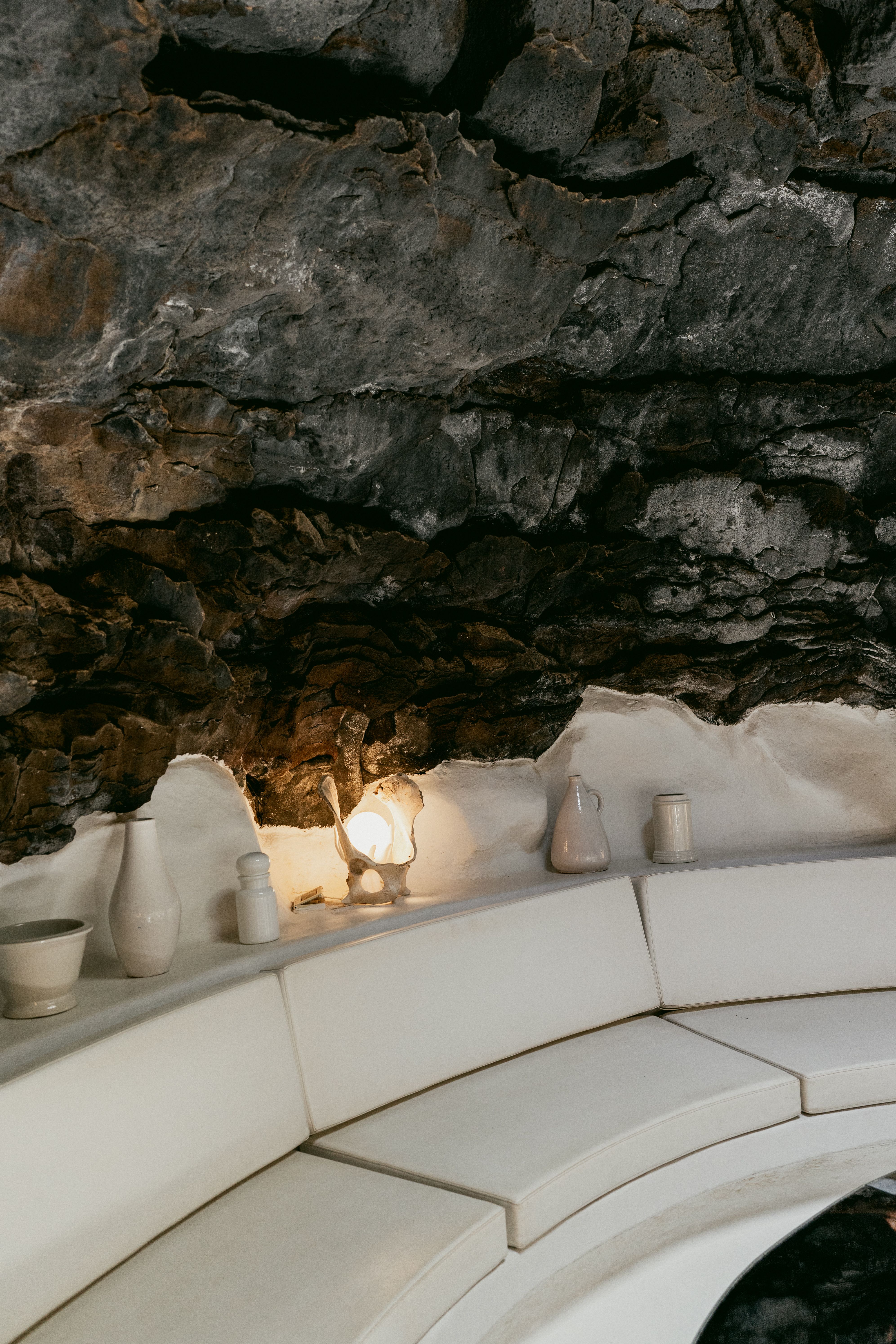 Sofa Seat with Vases under a Rock Formation · Free Stock Photo