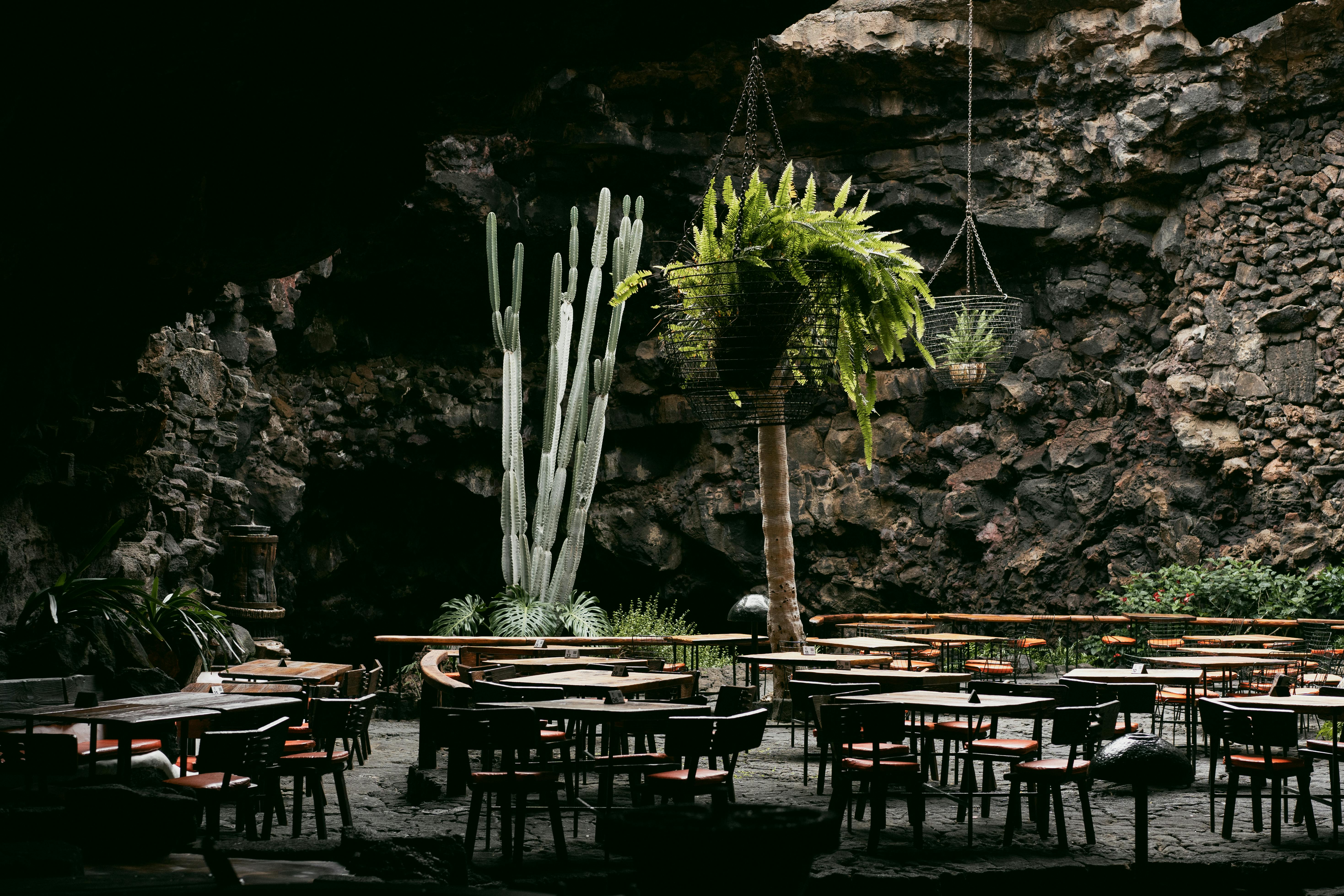 Seats and Tables in Restaurant in Cave · Free Stock Photo