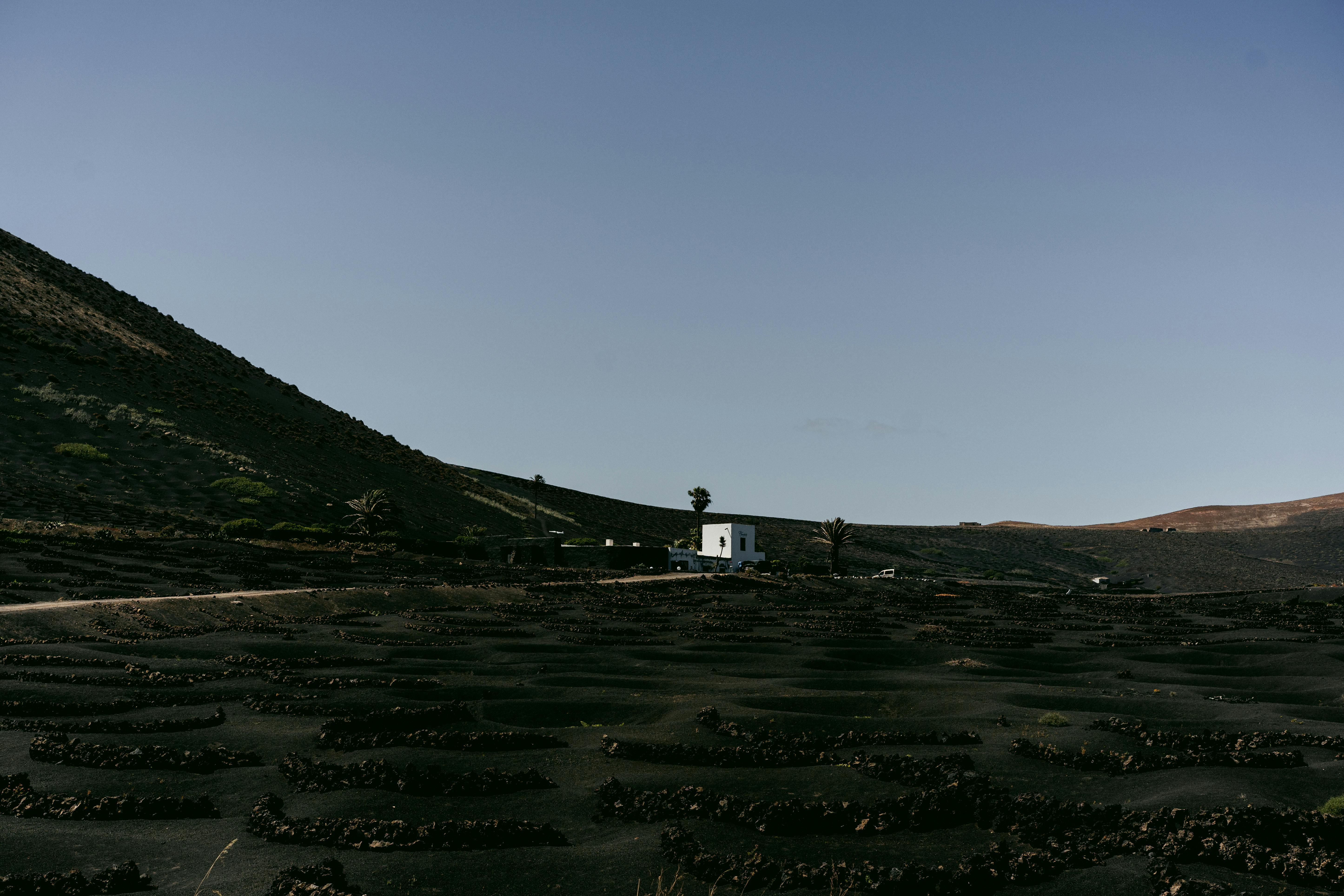 House in Valley in Mountains Landscape · Free Stock Photo