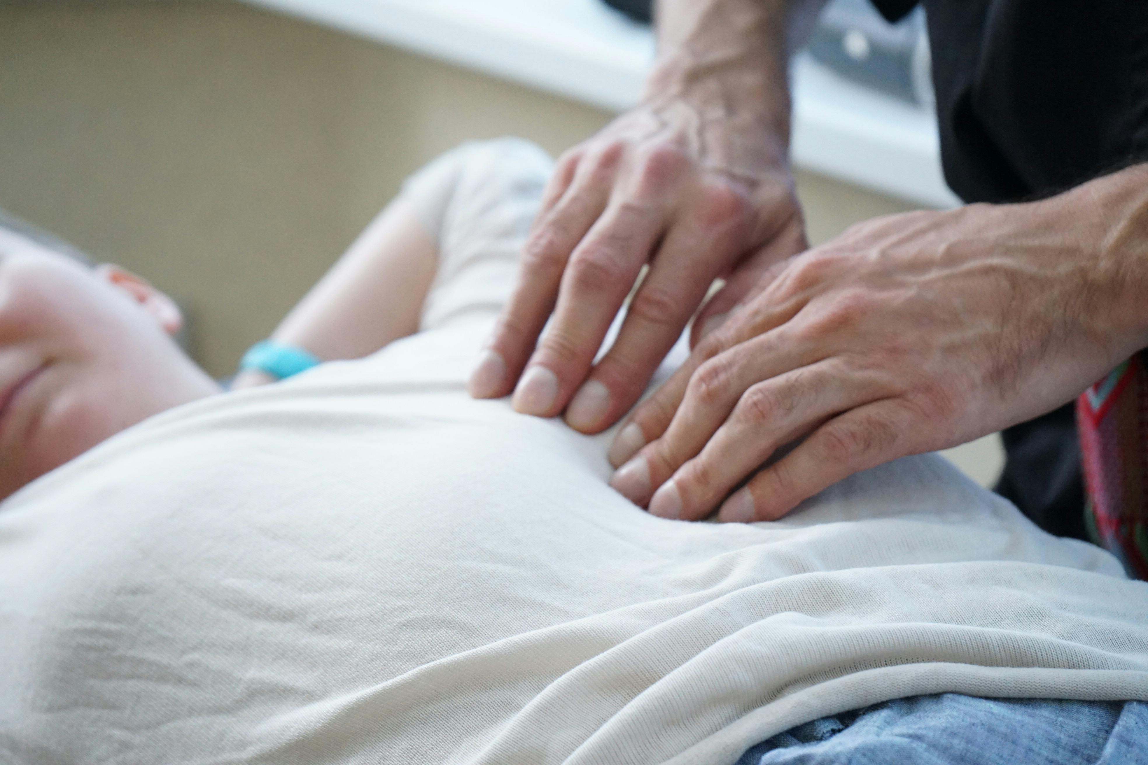 Hands Doing Massage on Back · Free Stock Photo