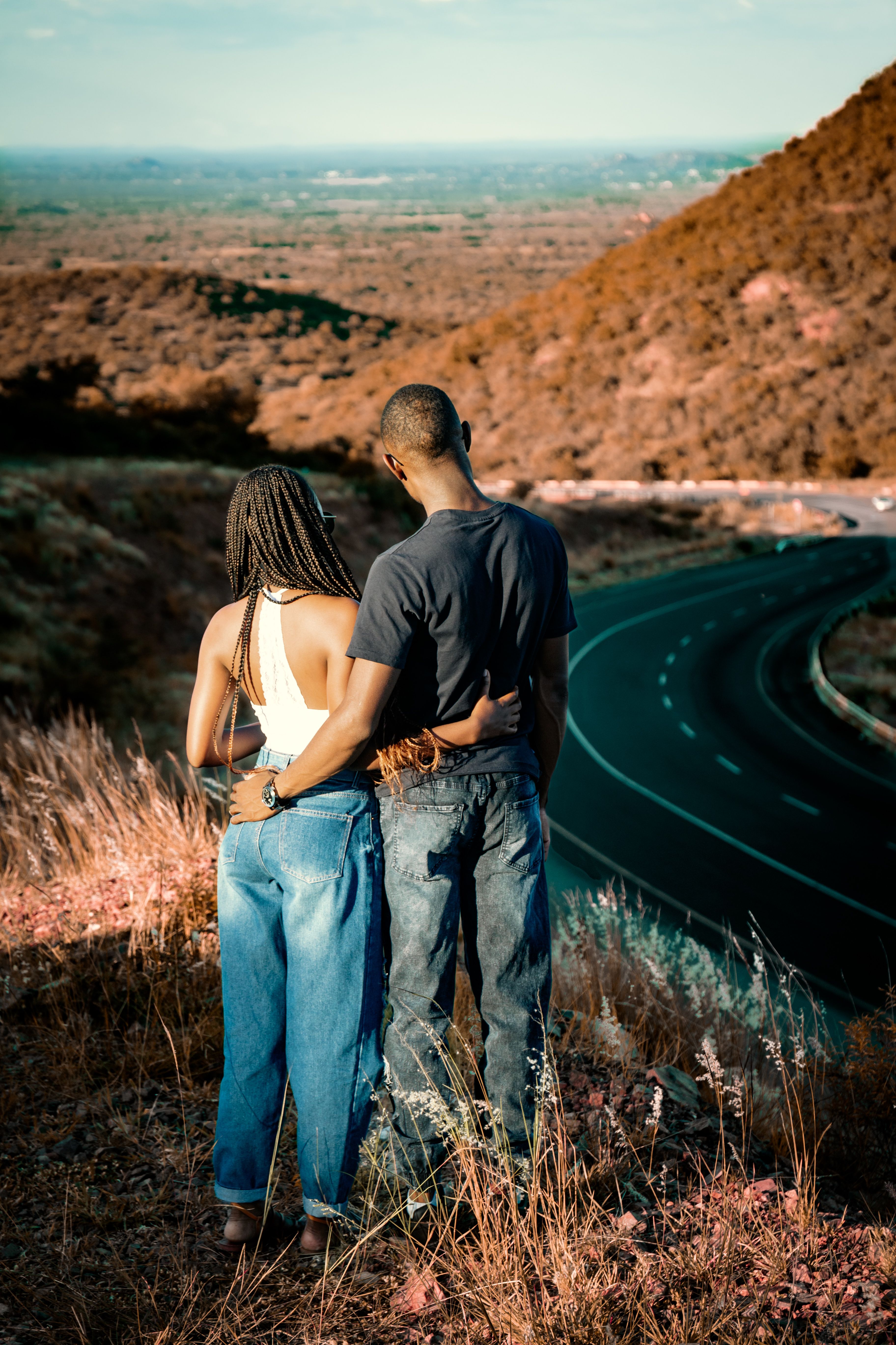 Couple Admiring Scenic Mountain View Outdoors · Free Stock Photo