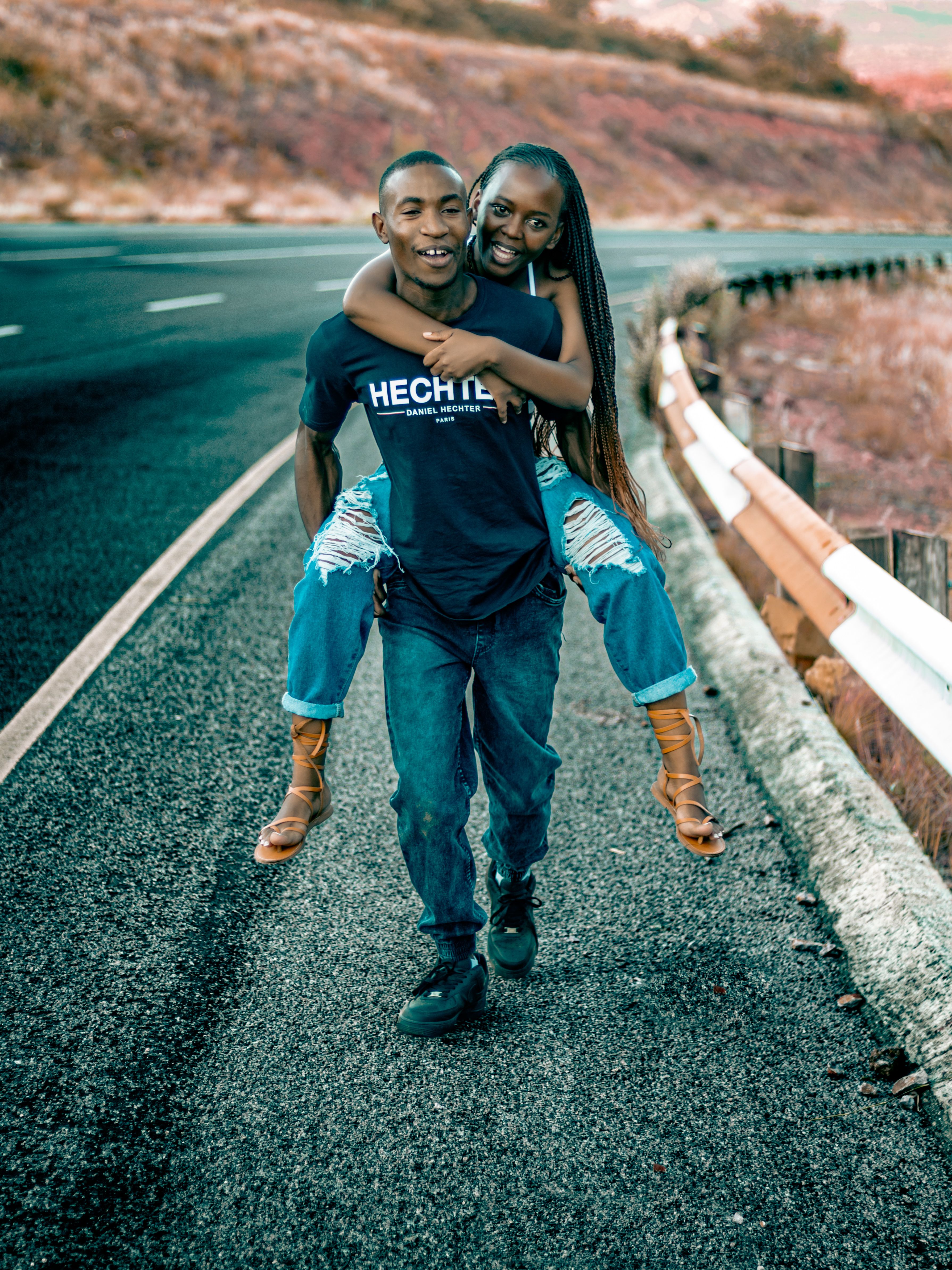 Man Carrying Piggyback Woman · Free Stock Photo