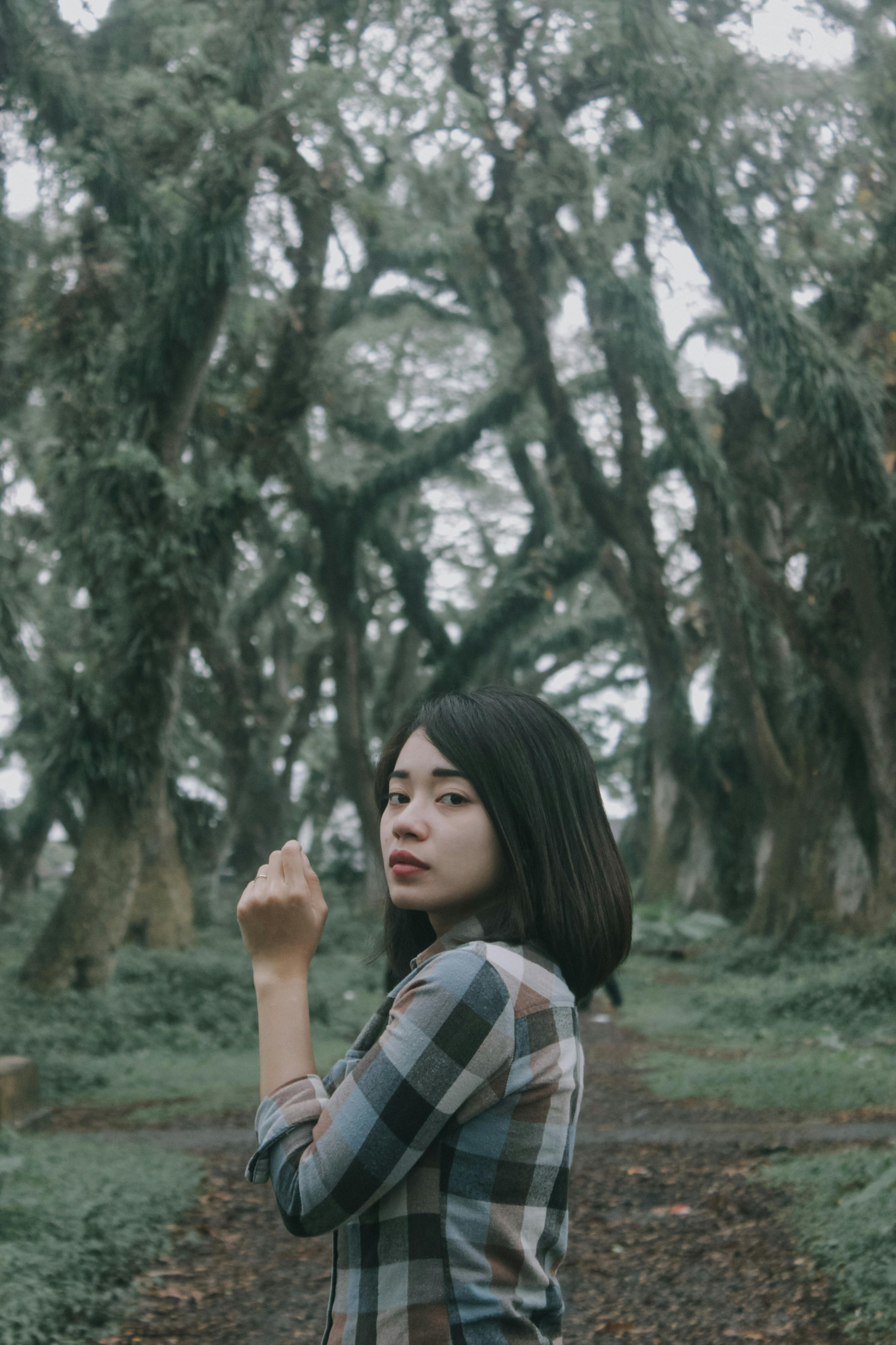 Photo of a Model with Short Hair Looking Over Her Shoulder · Free Stock ...