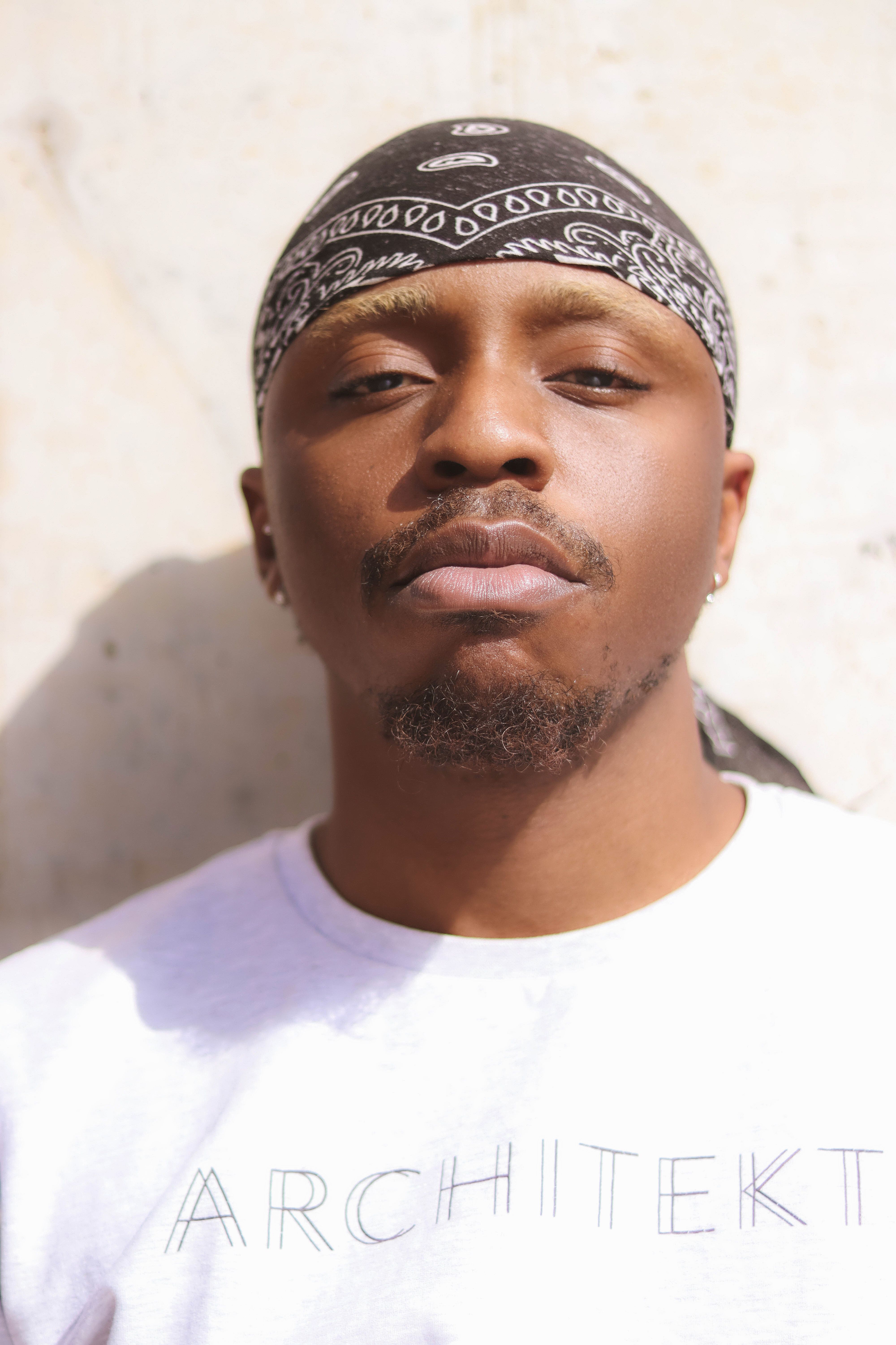 Close-Up Photo of Man wearing Black Bandana · Free Stock Photo