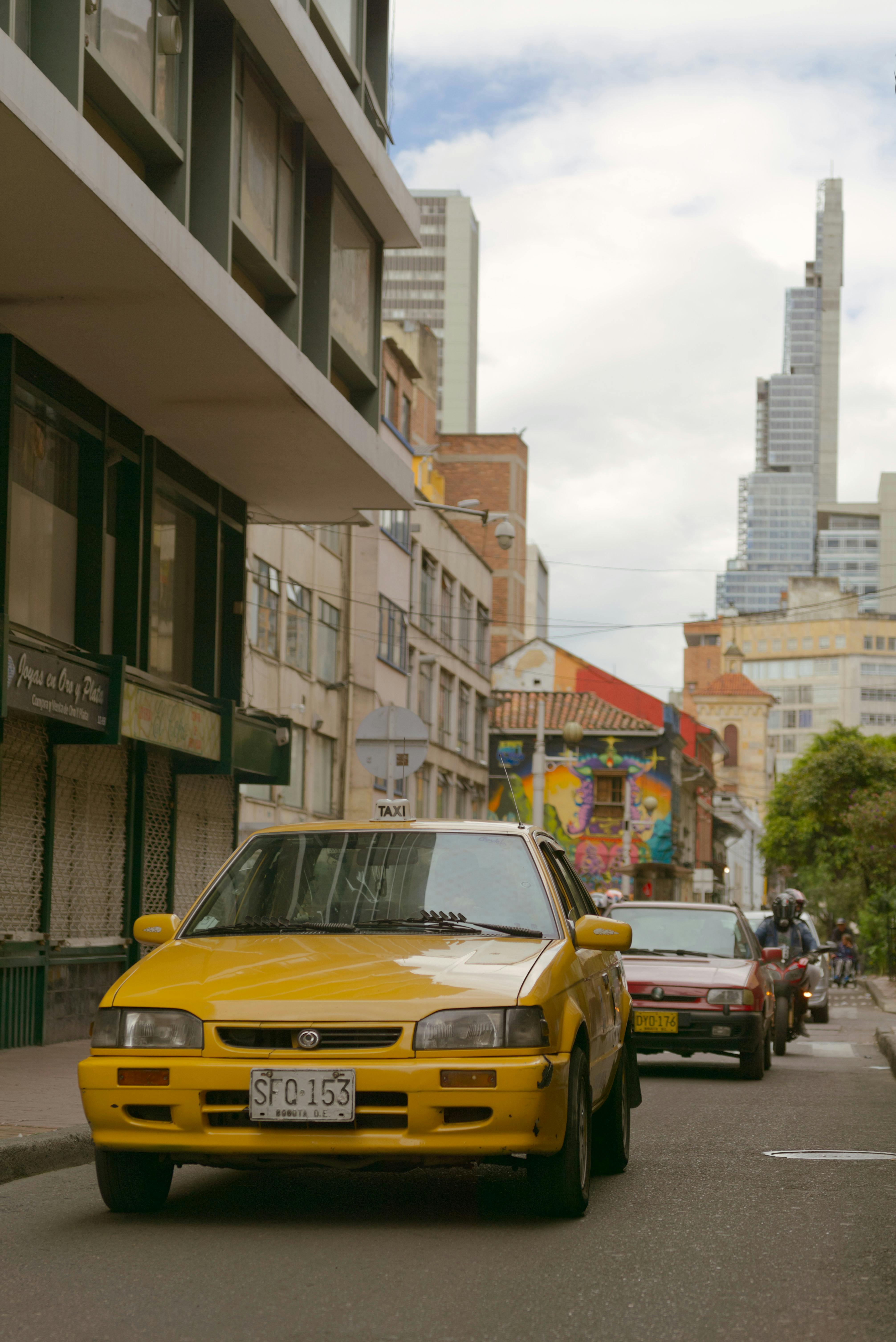 Yellow Taxi on the Road · Free Stock Photo