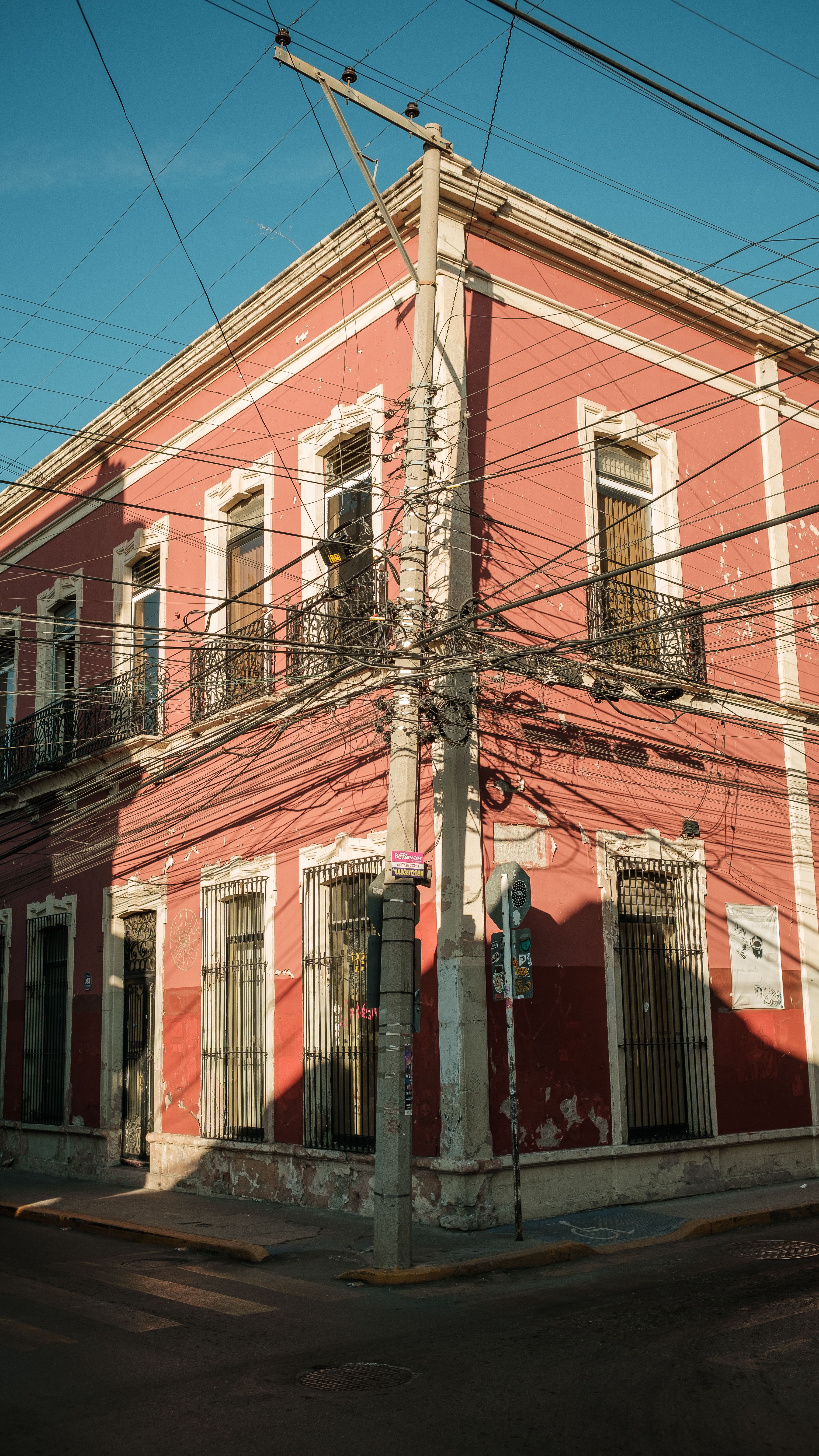 Power Lines near Building in Town · Free Stock Photo