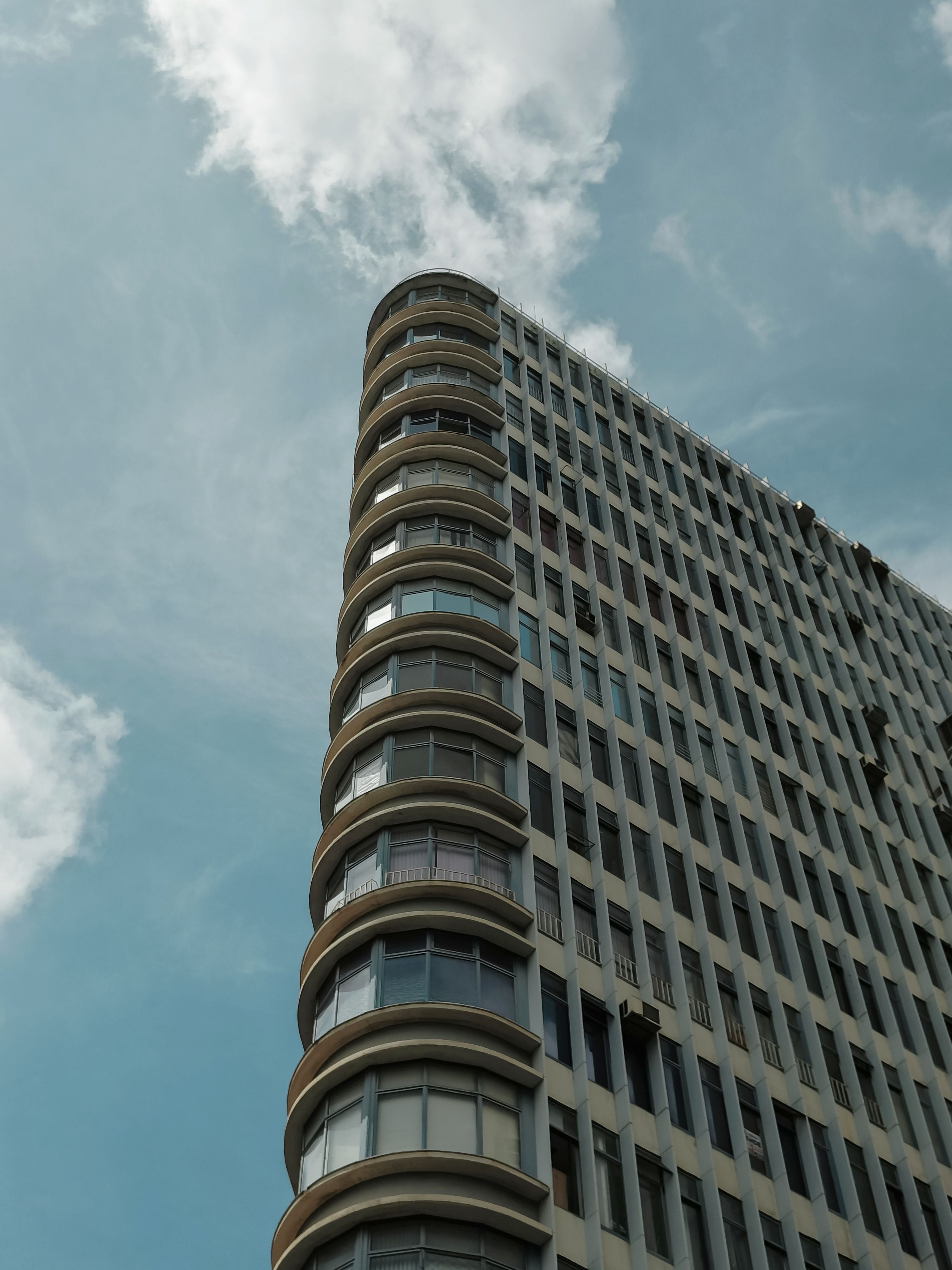 Low-angle Photography of Gray Spiral Building · Free Stock Photo