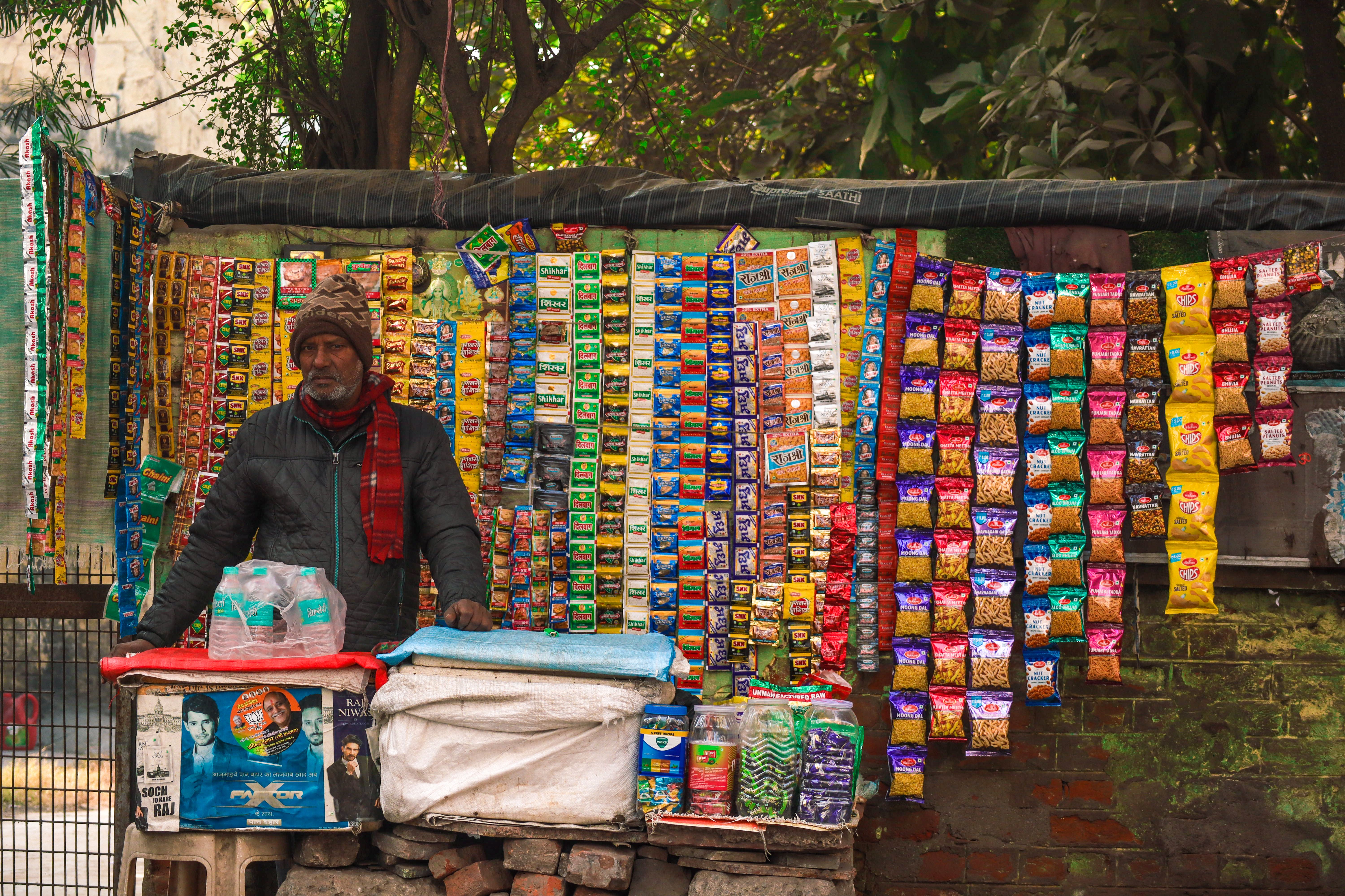 Man Selling on City Street · Free Stock Photo