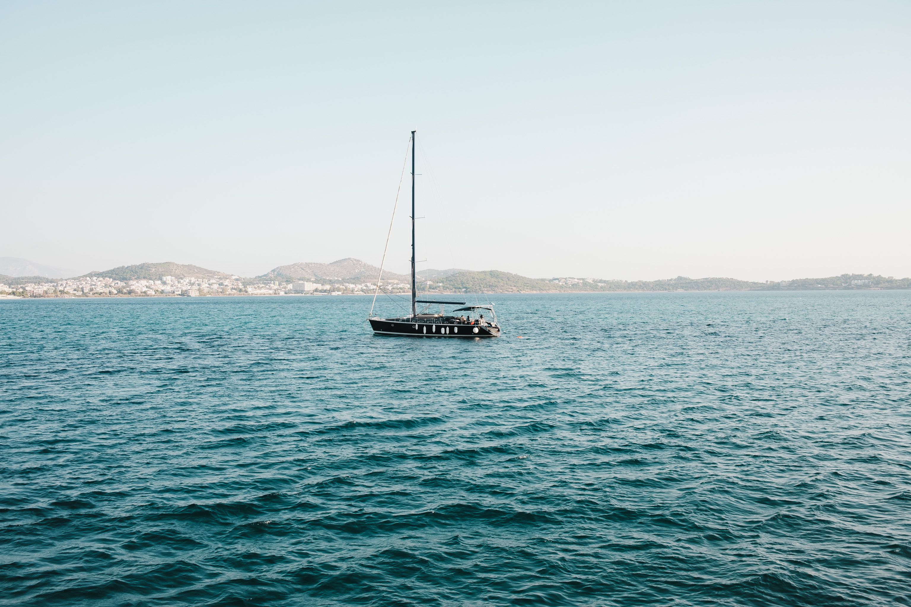Sailboat on Sea Coast · Free Stock Photo