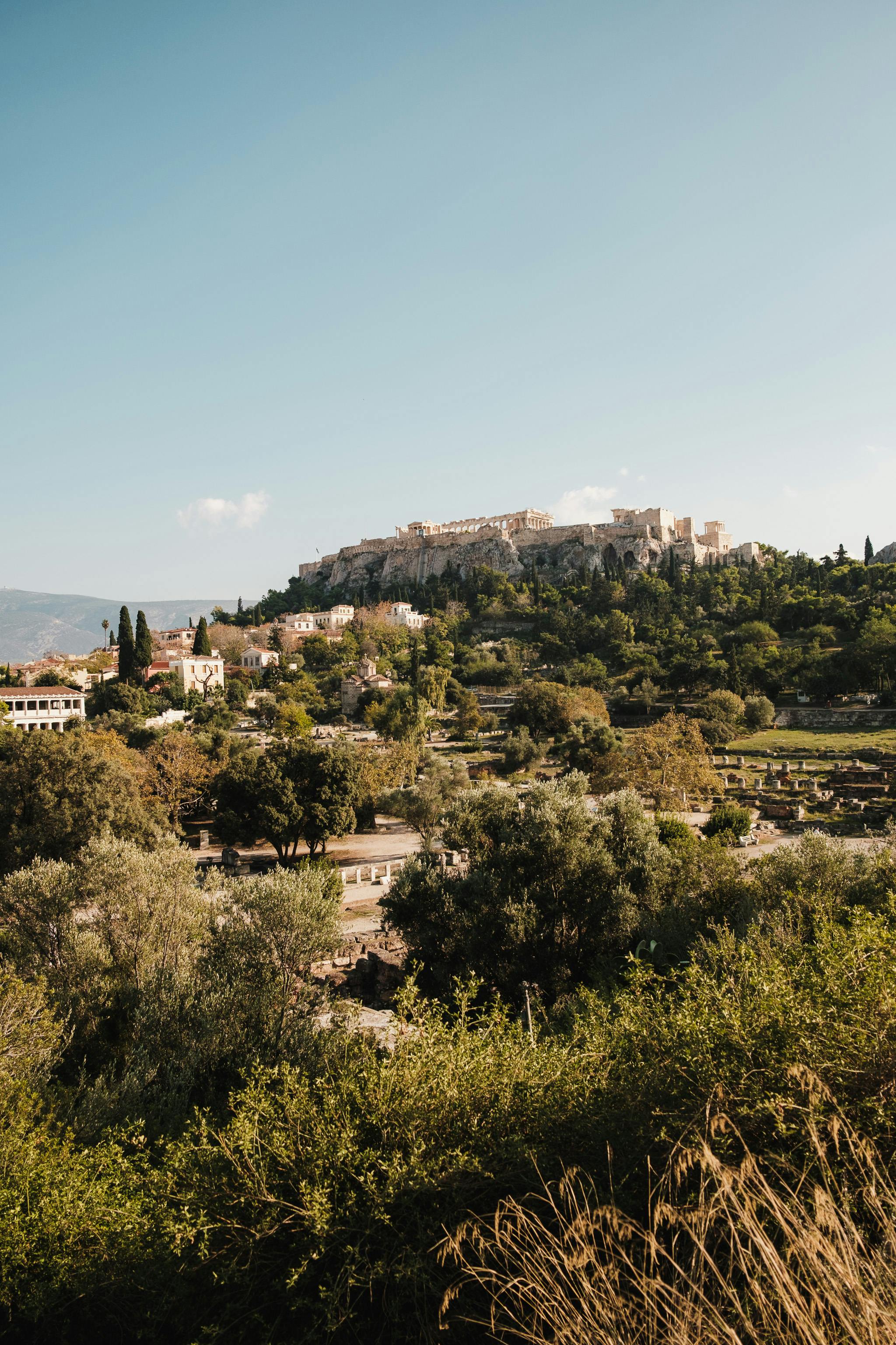 Clear Sky Over a Hillside Town in Summer · Free Stock Photo