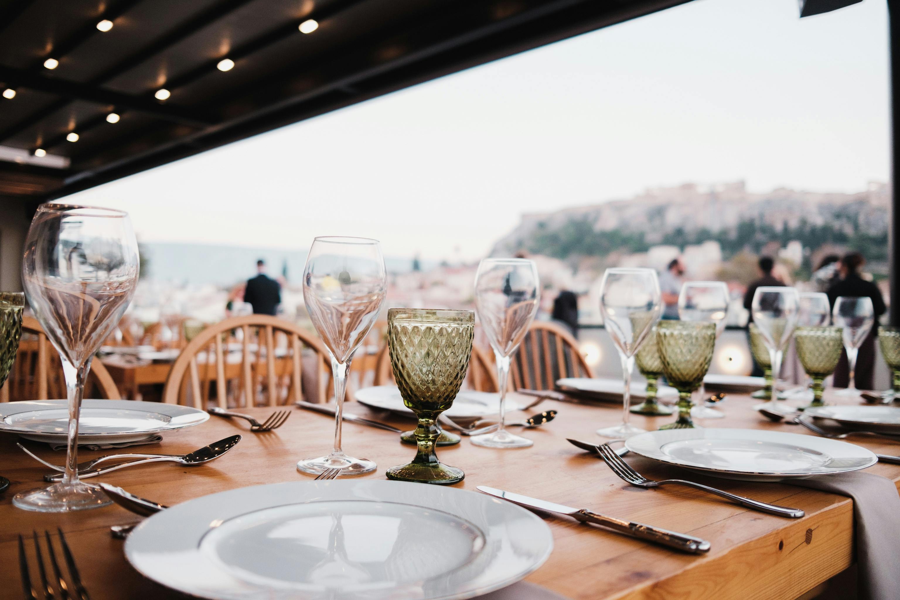 Dishes and Cutlery on Restaurant Table · Free Stock Photo