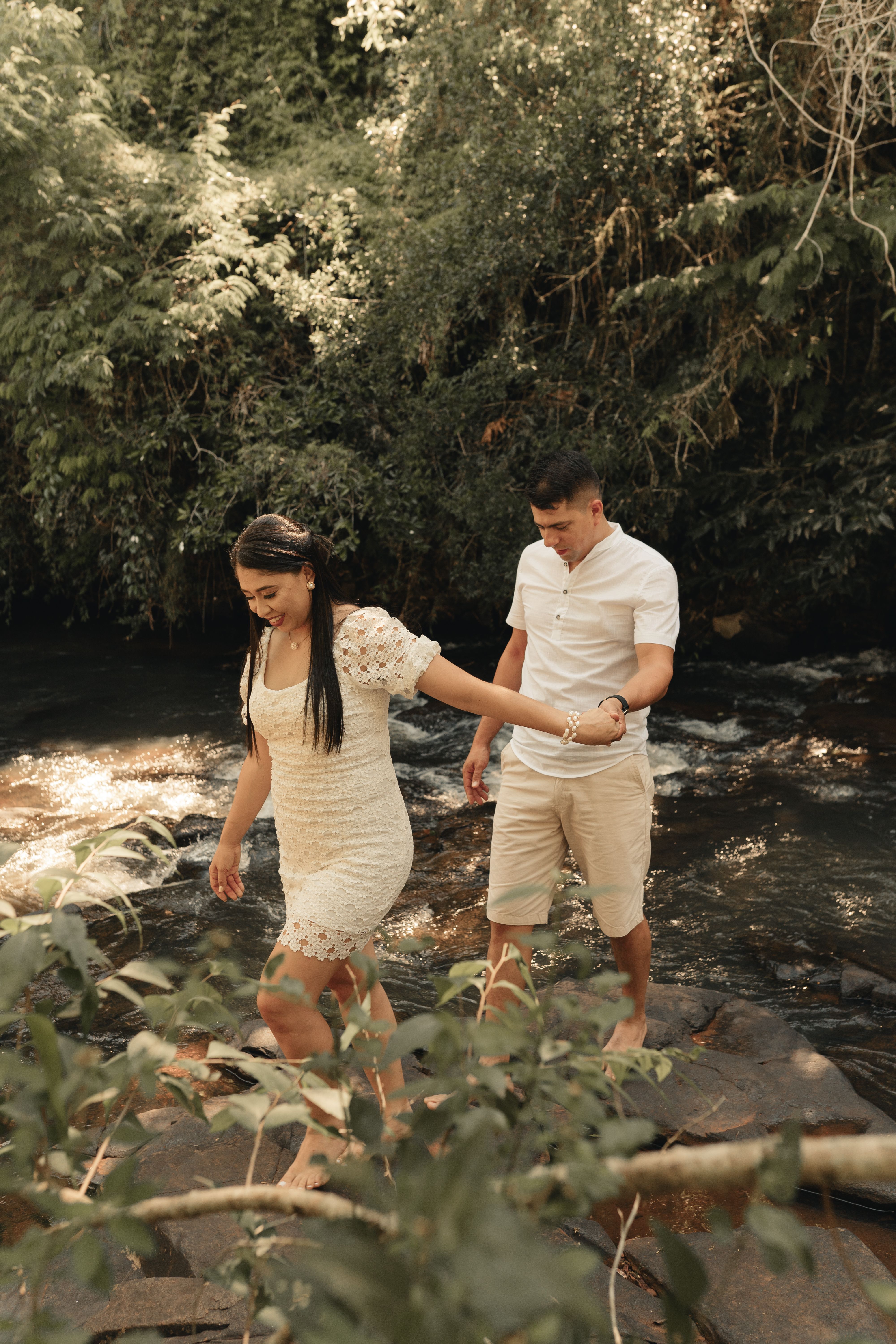 Couple Walking near Stream and Trees · Free Stock Photo