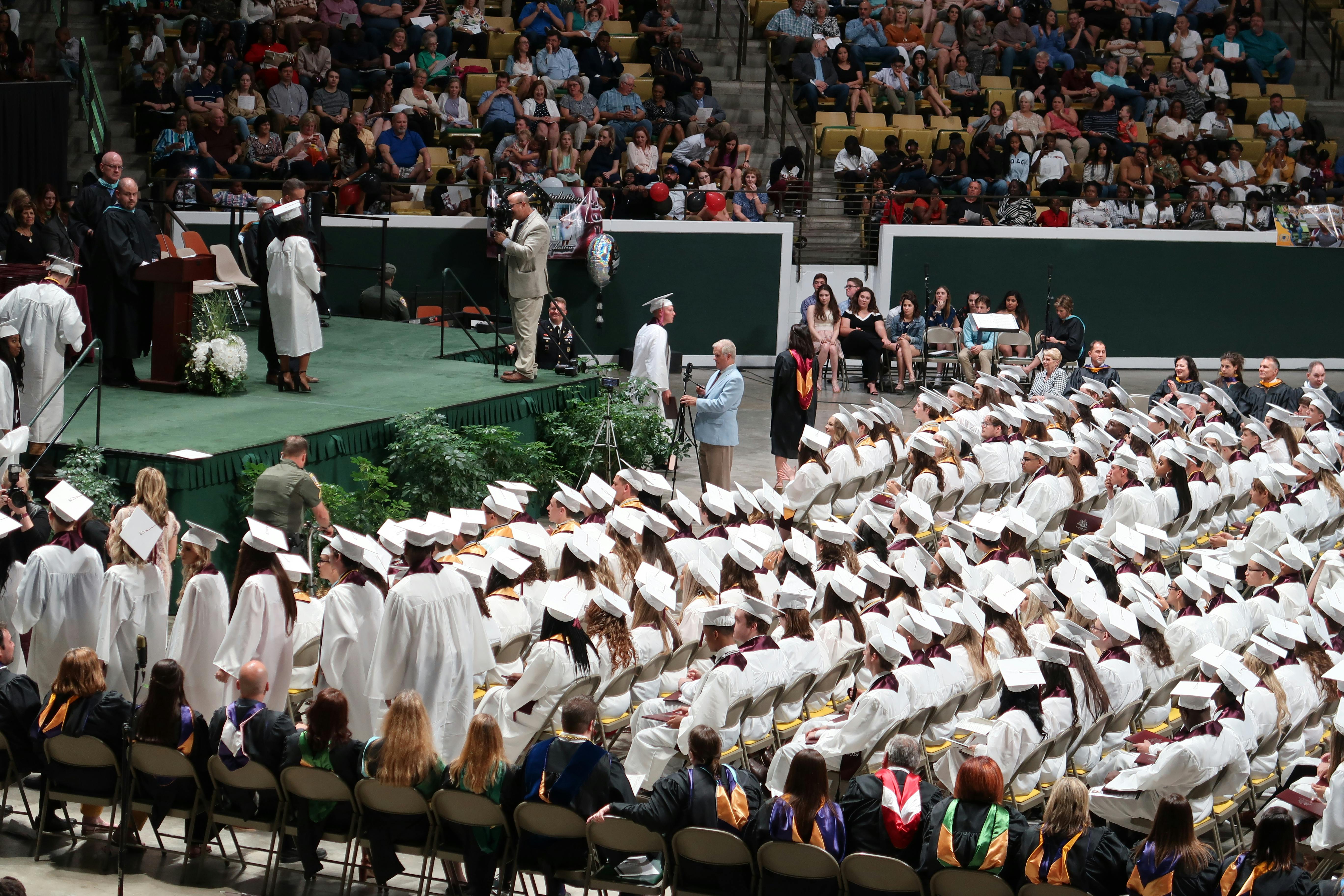 Group of Graduate Students Throwing Their Graduation Caps · Free Stock ...