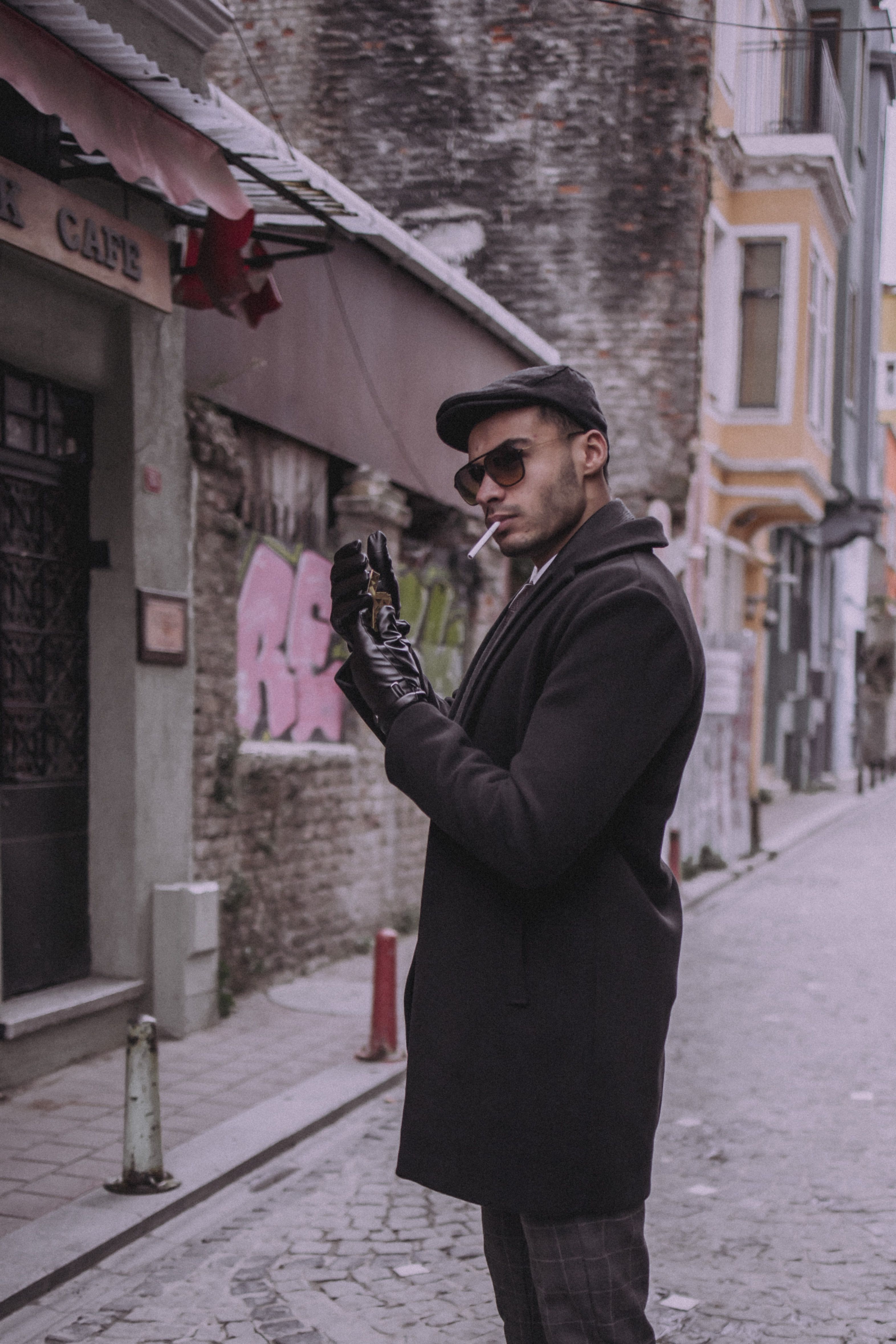 Outdoor Photo of a Model Smoking a Cigarette · Free Stock Photo