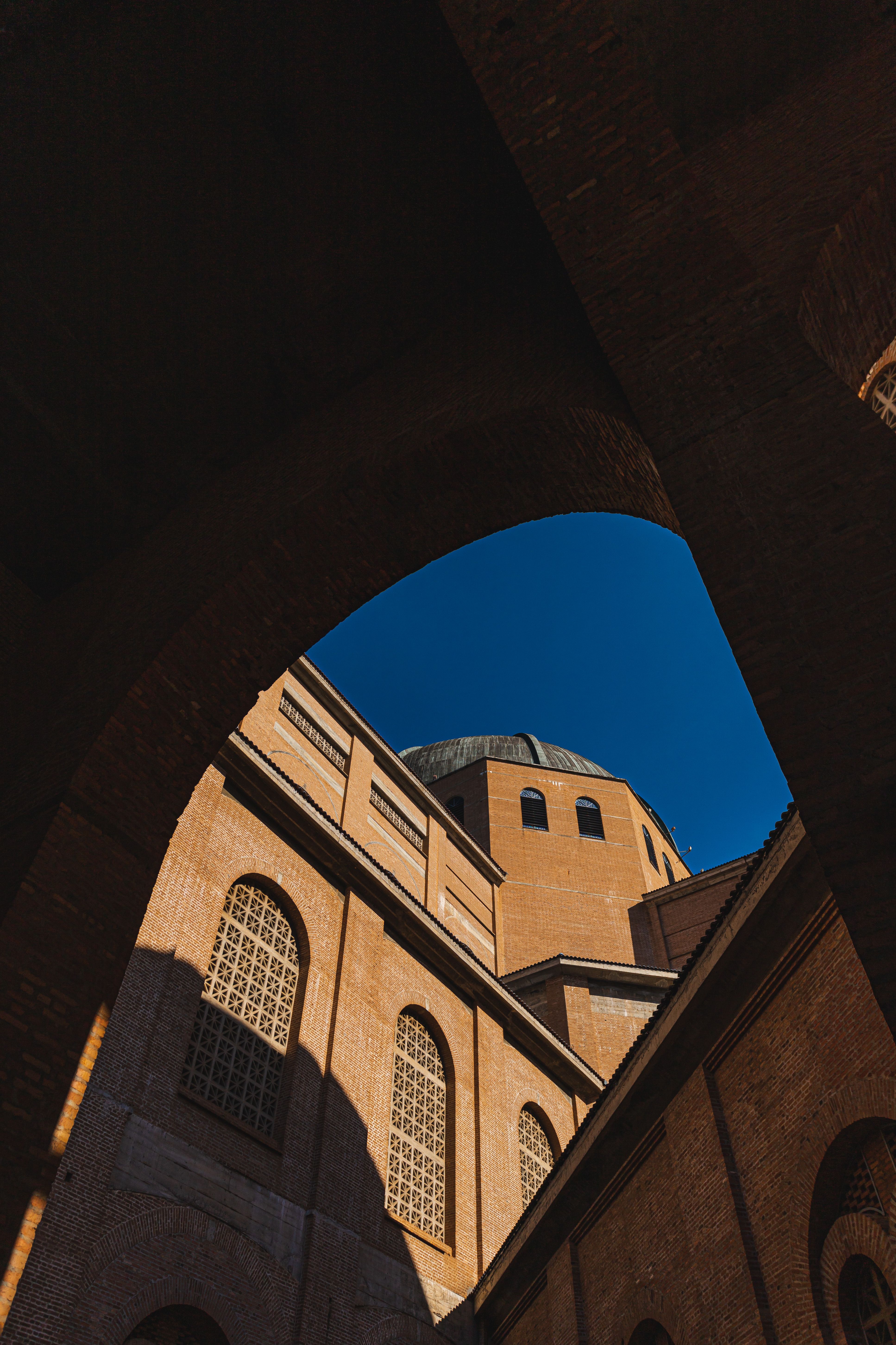 Low Angle Shot of a Roman Building · Free Stock Photo