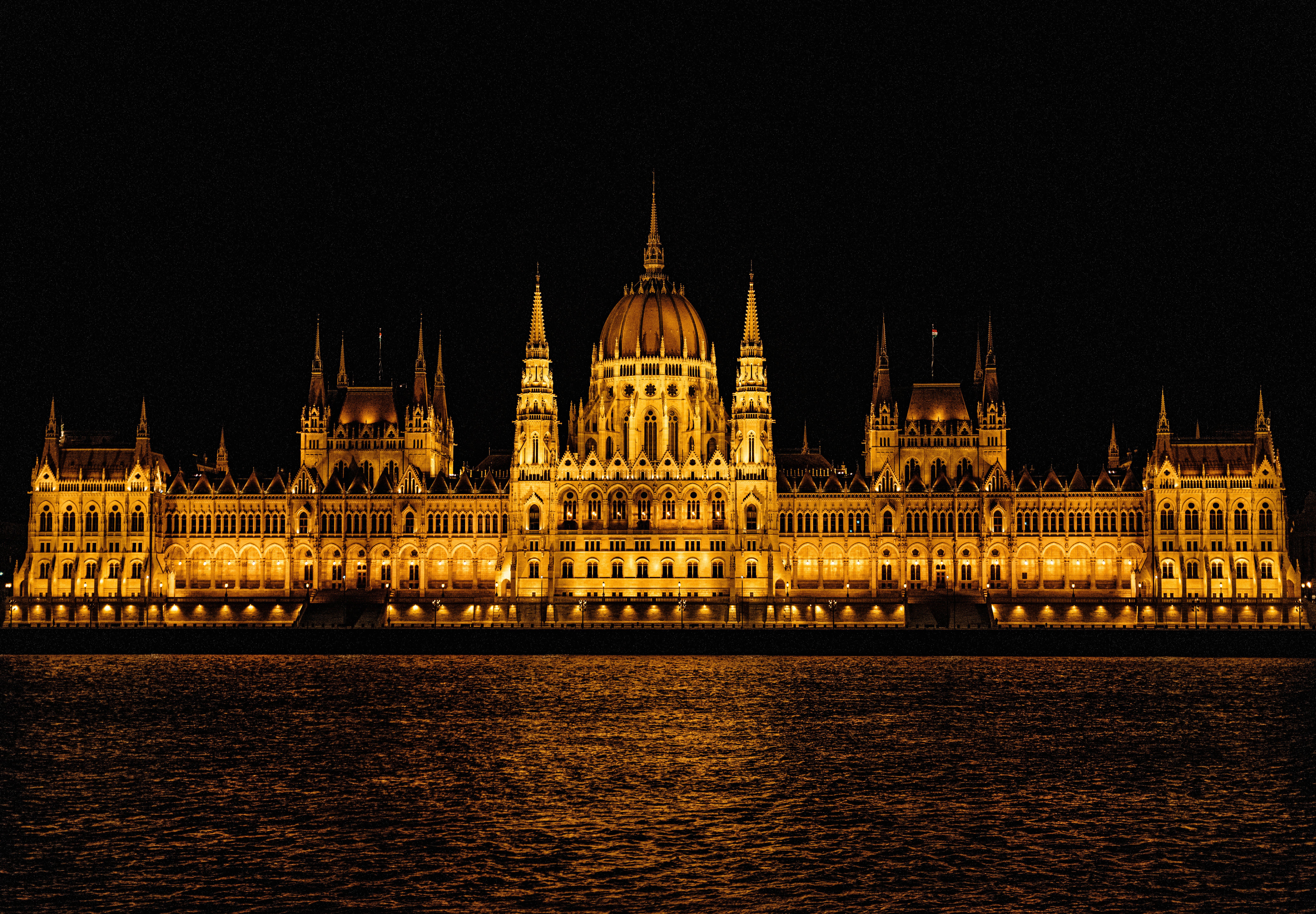 Illuminated Facade of the Hungarian Parliament Building · Free Stock Photo