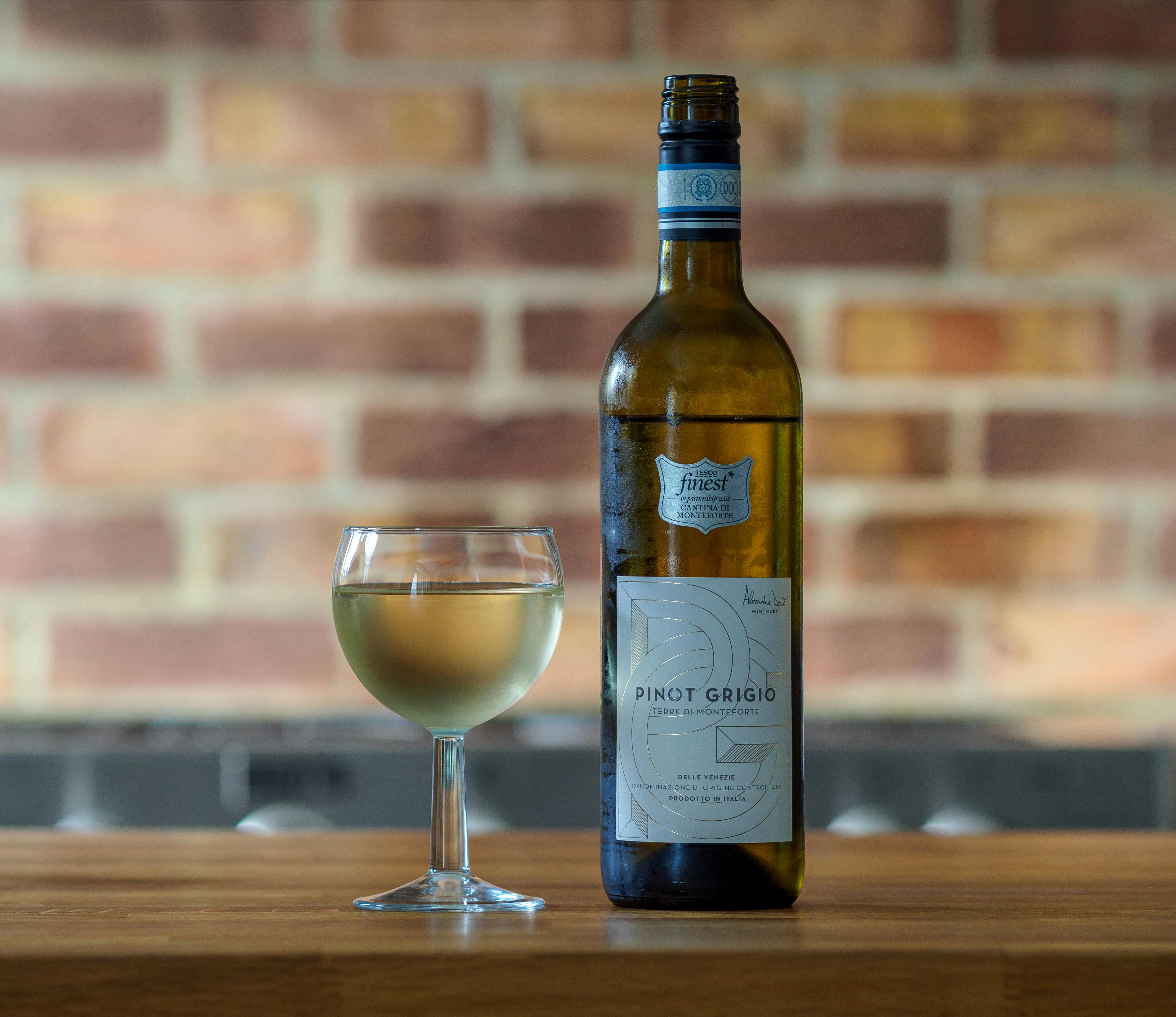 Close-Up Photo of Wine Bottle near Wine Glass · Free Stock Photo