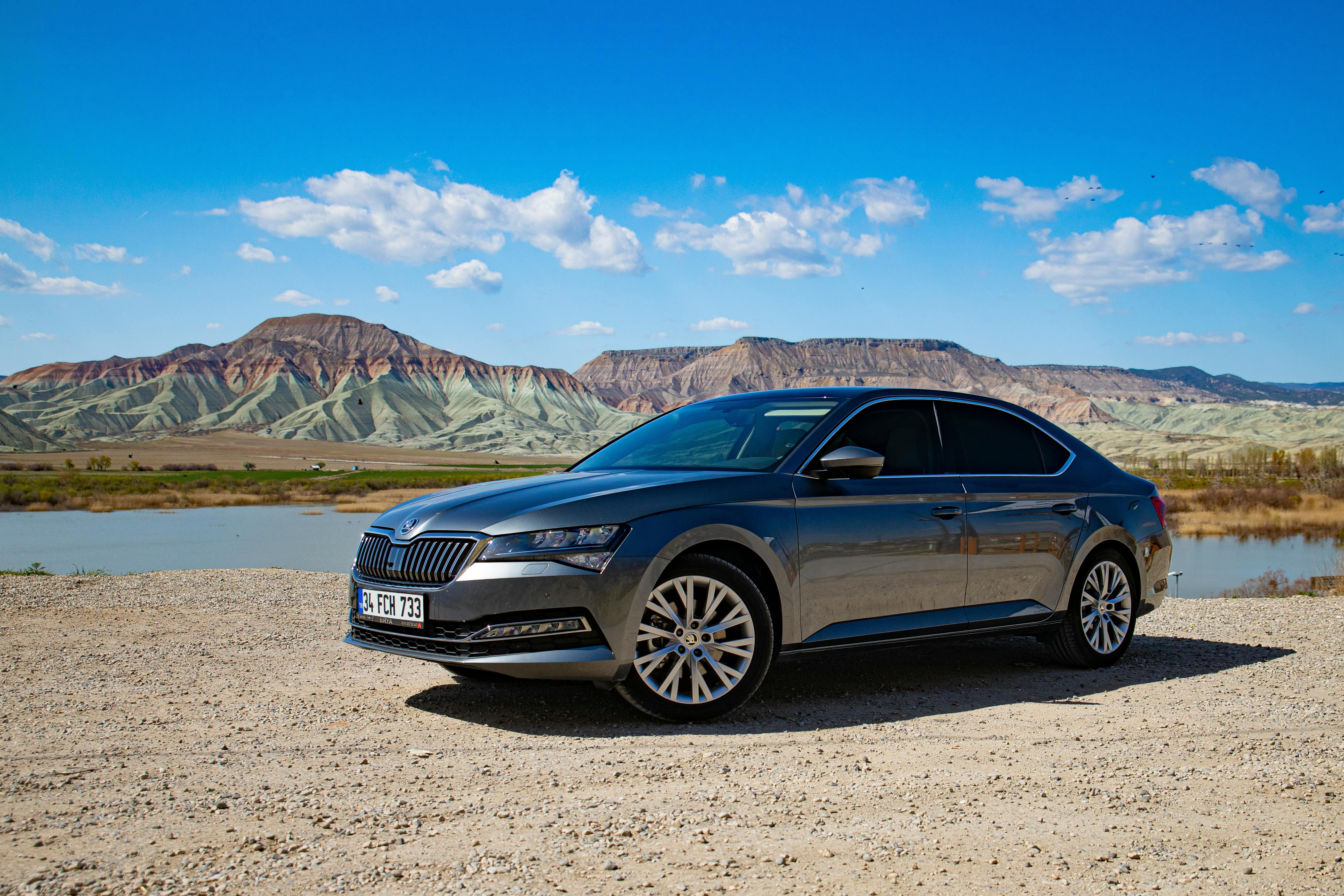 Skoda on Sea Shore · Free Stock Photo