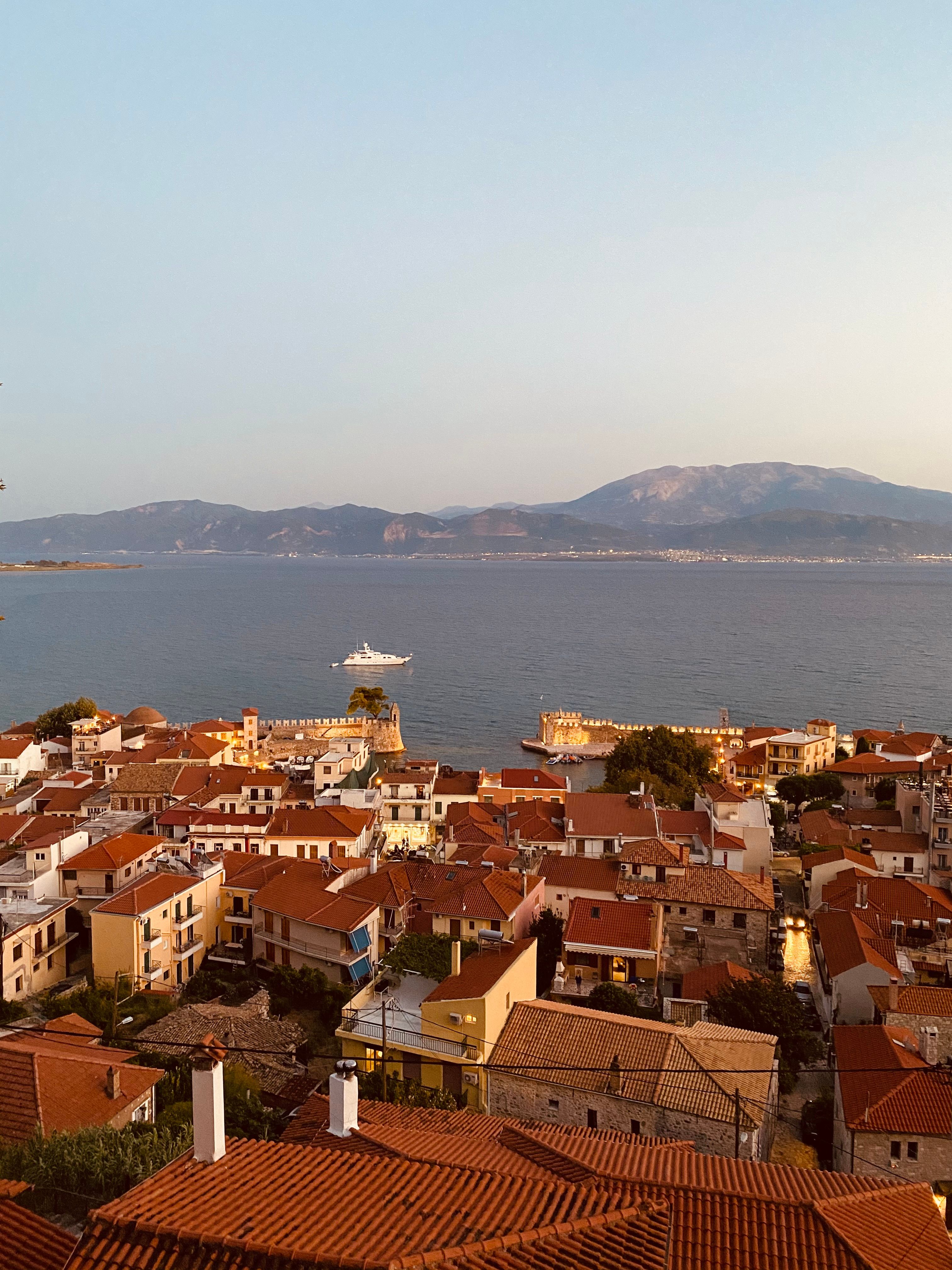 Scenic Mediterranean Rooftop View over the Sea · Free Stock Photo