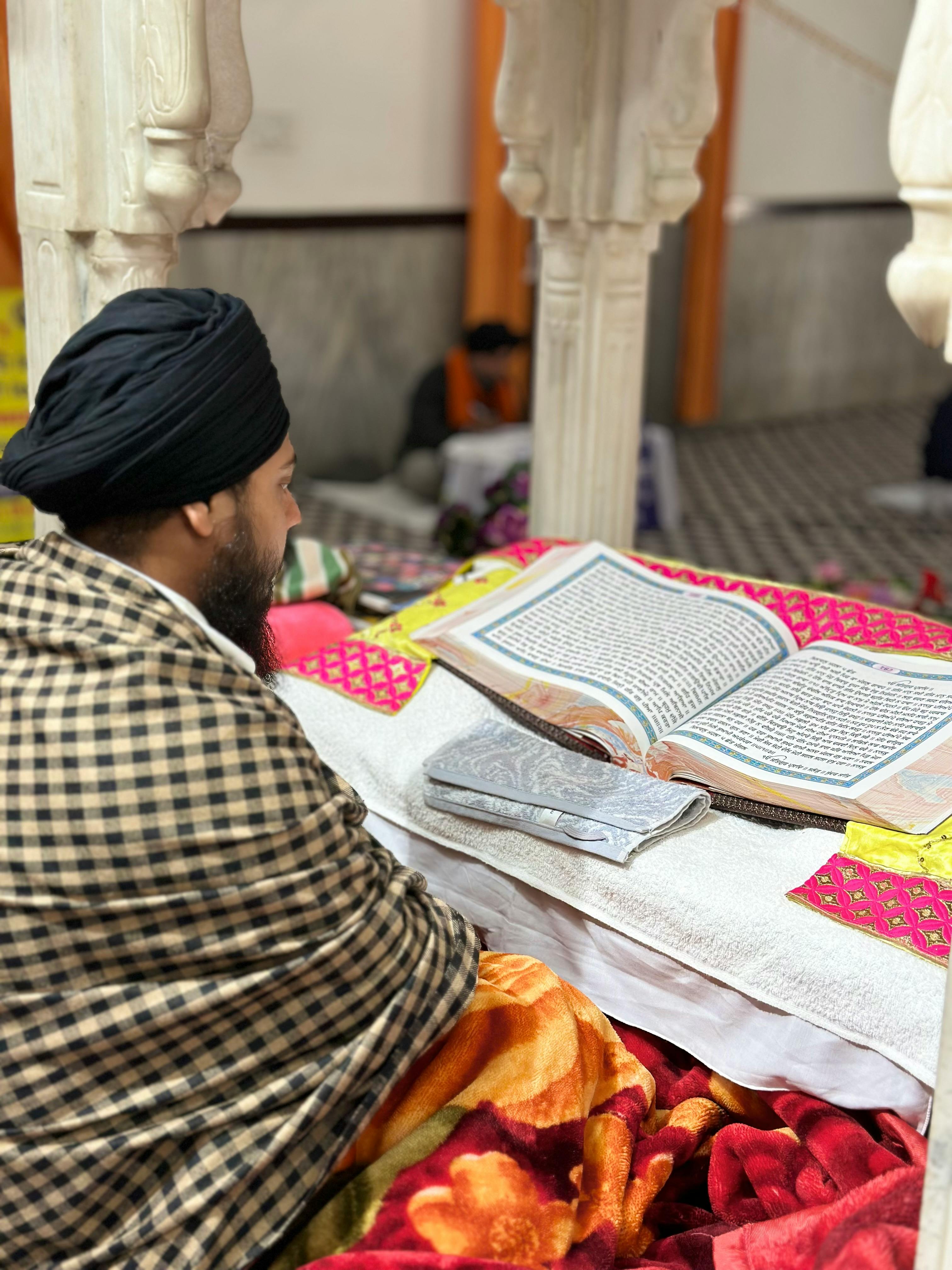 Koran on Wooden Shelf in Mosque · Free Stock Photo