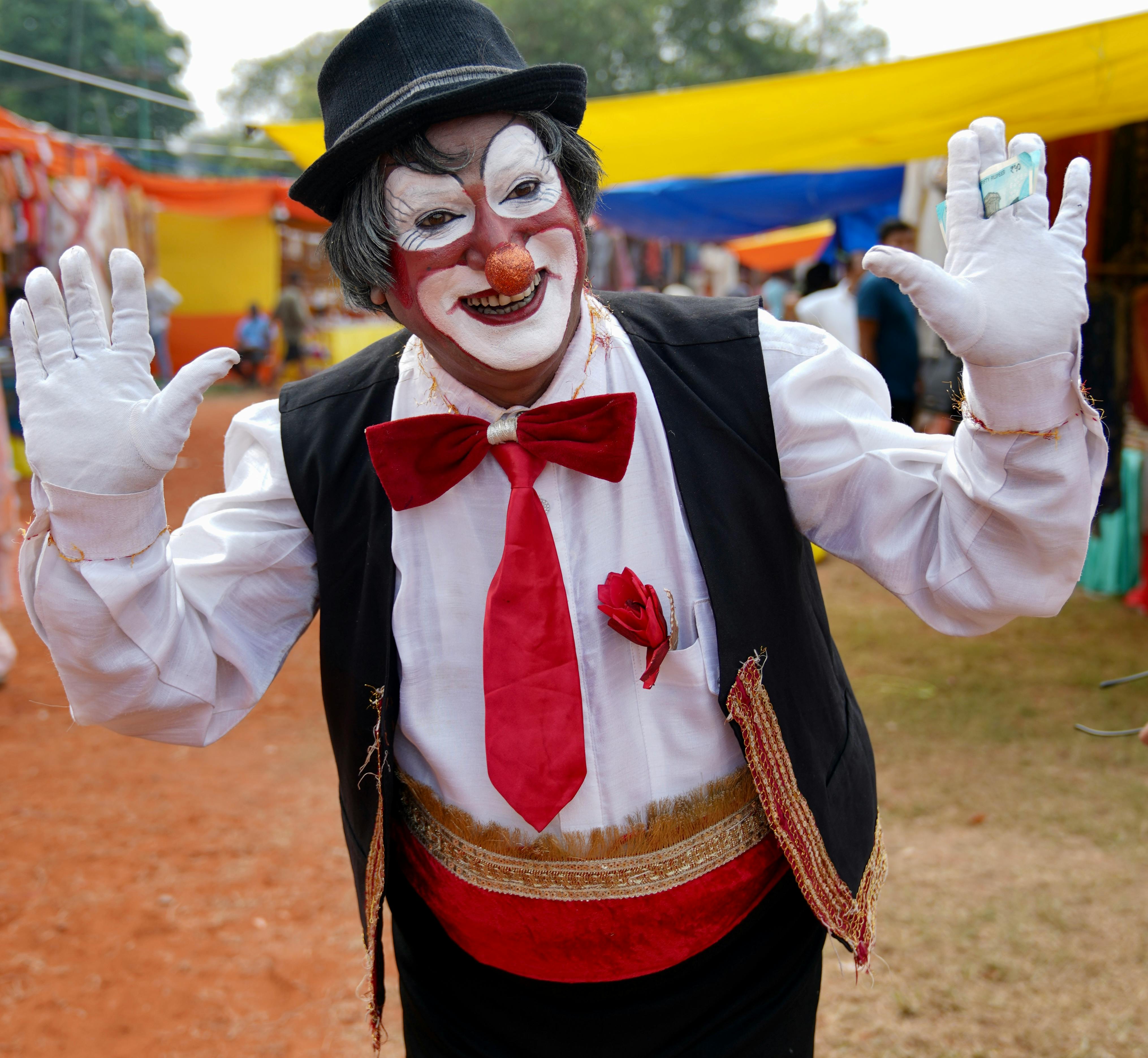 Funny clown with makeup and costume on street with umbrella · Free ...