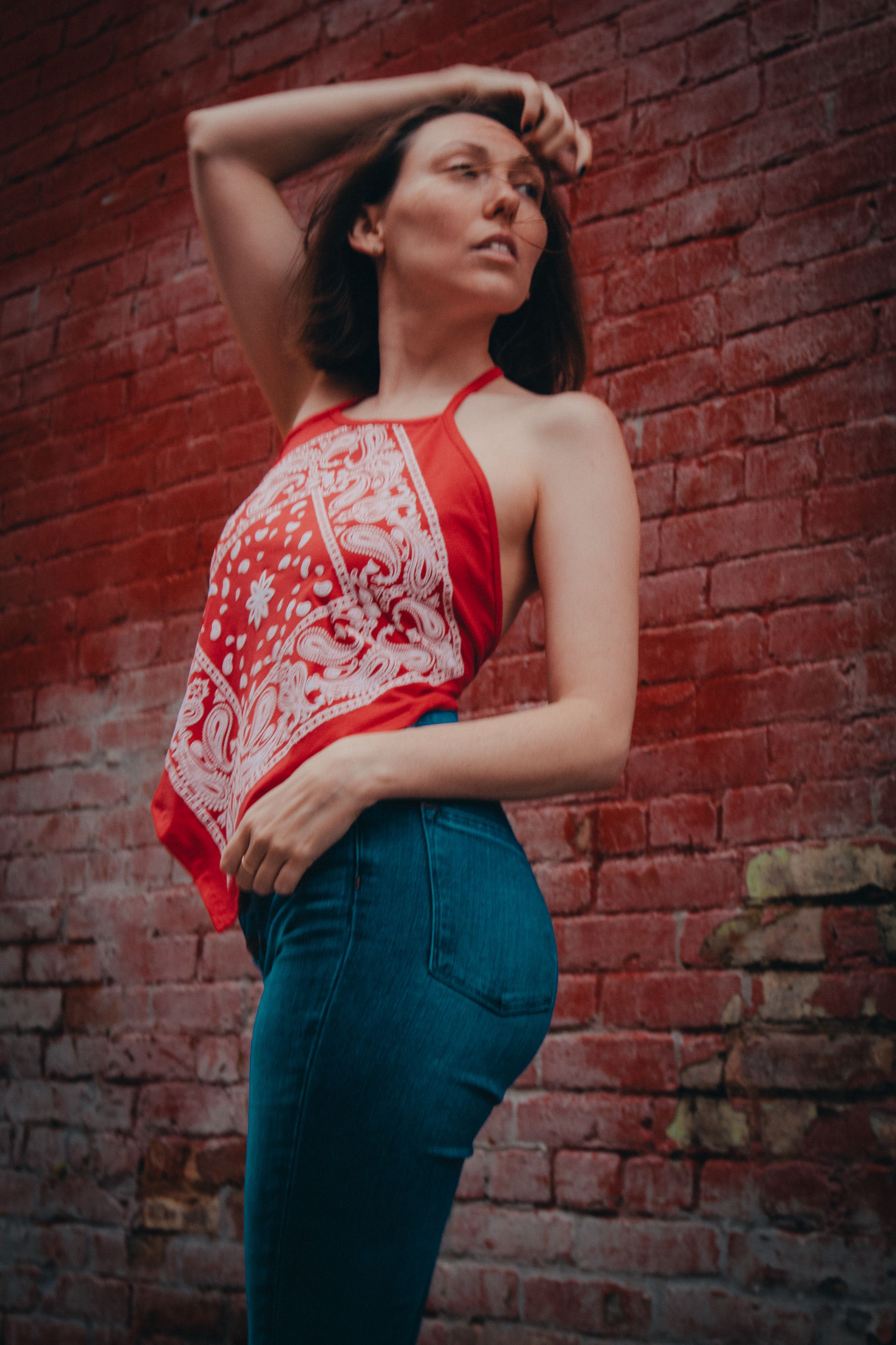 Woman Posing by Wall · Free Stock Photo