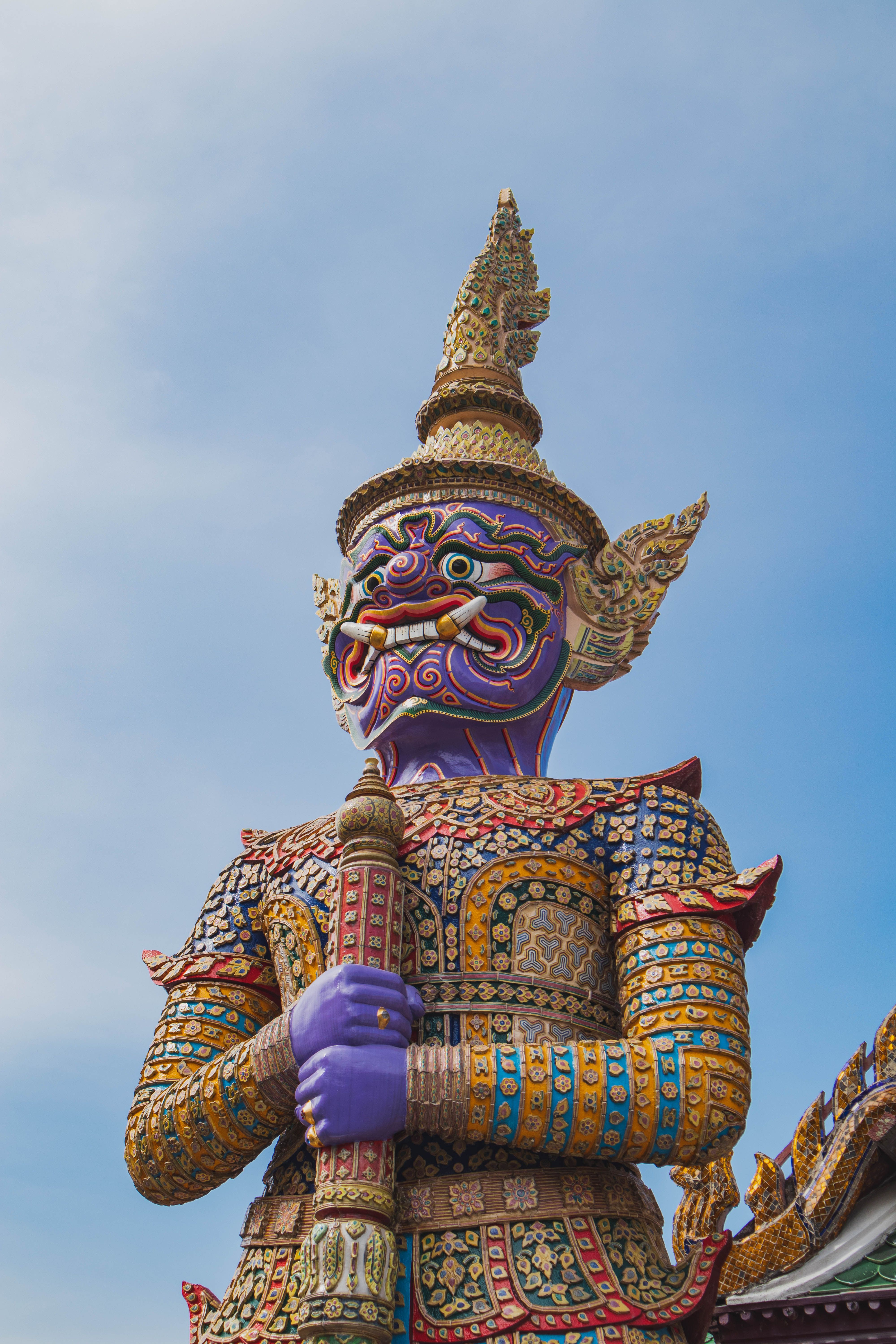Red Demon Statue against Blue Sky · Free Stock Photo