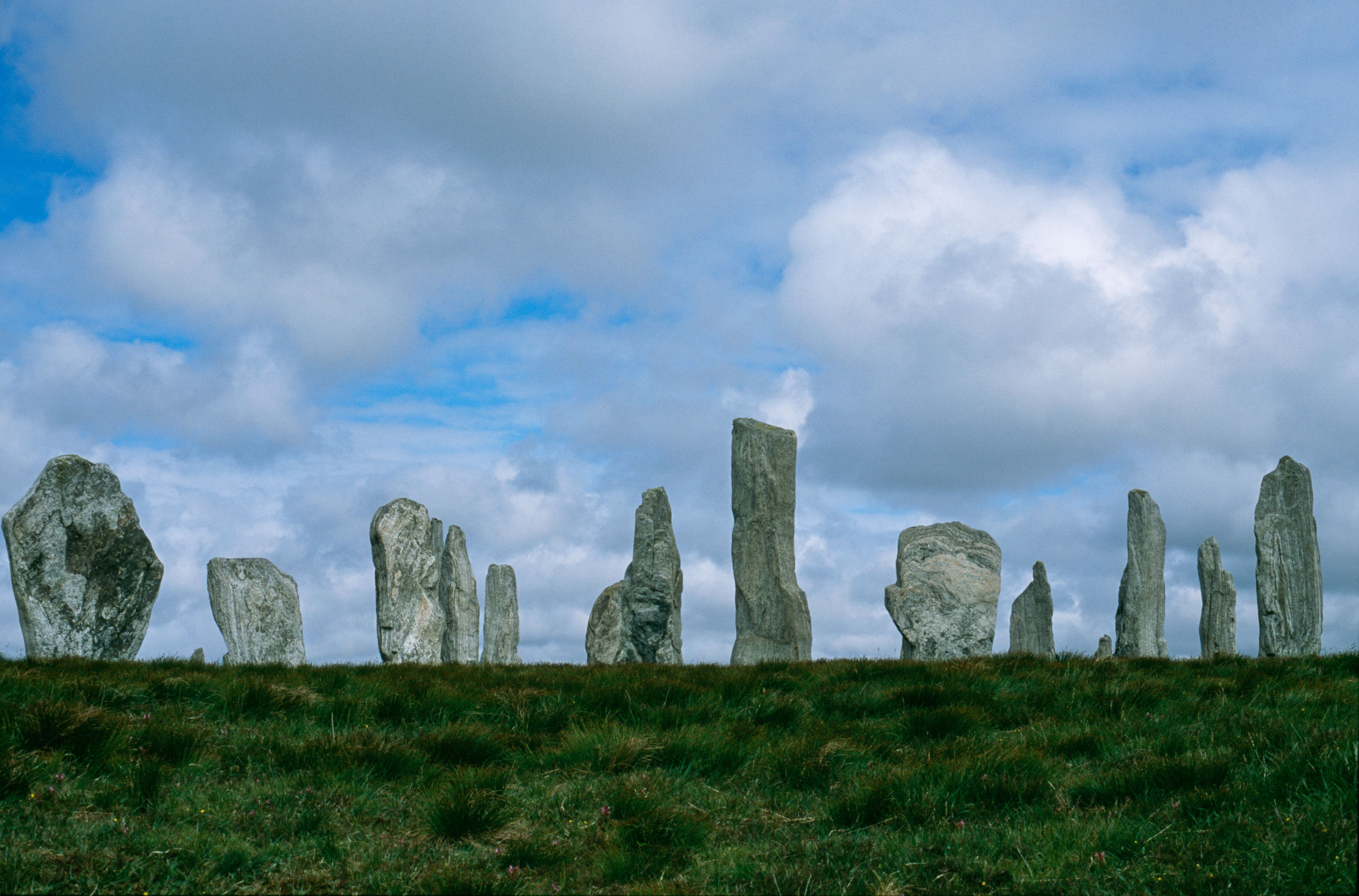 Clouds over Rock Formations on Grassland · Free Stock Photo