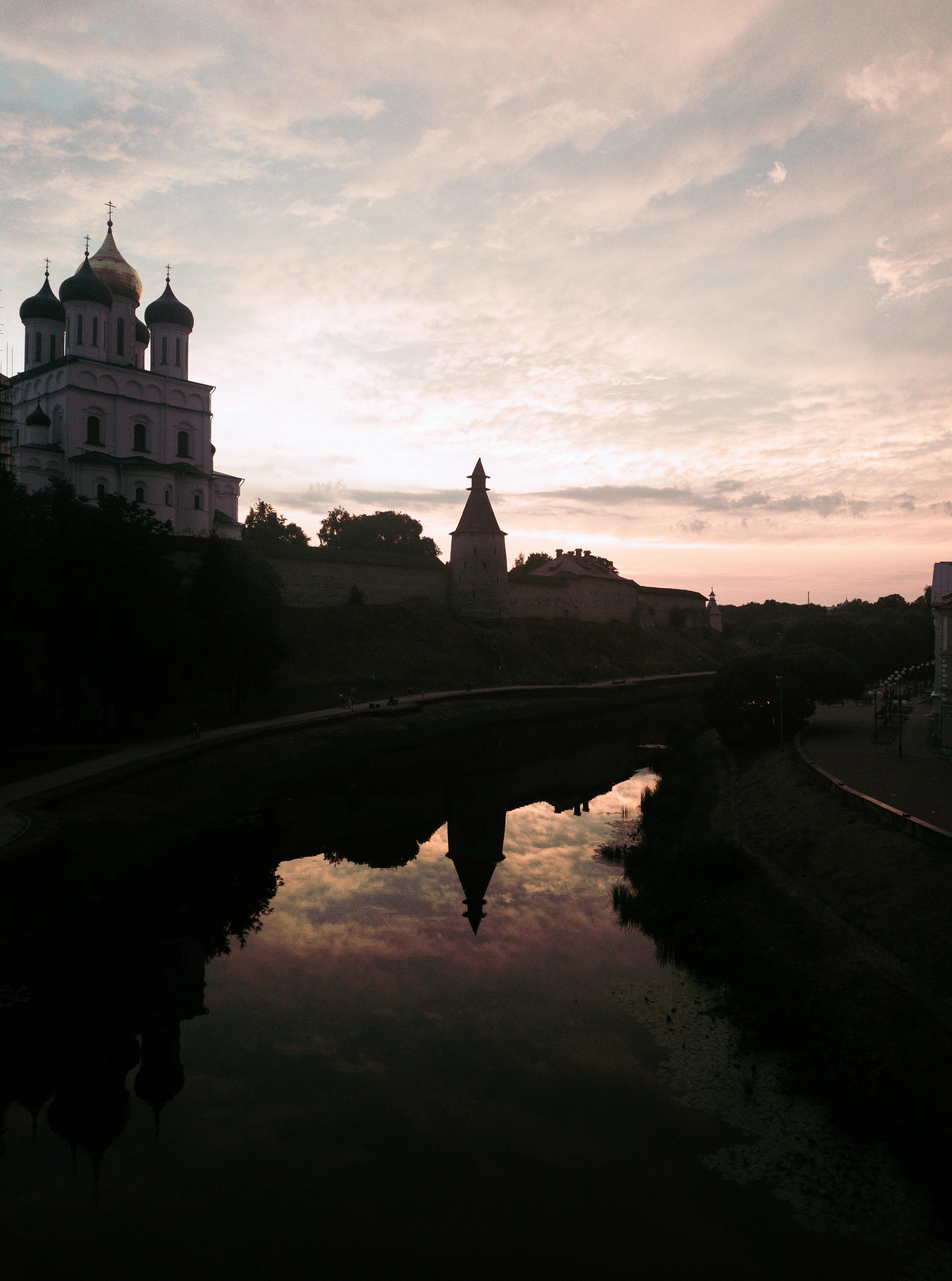 Orthodox Church over River at Sunset · Free Stock Photo