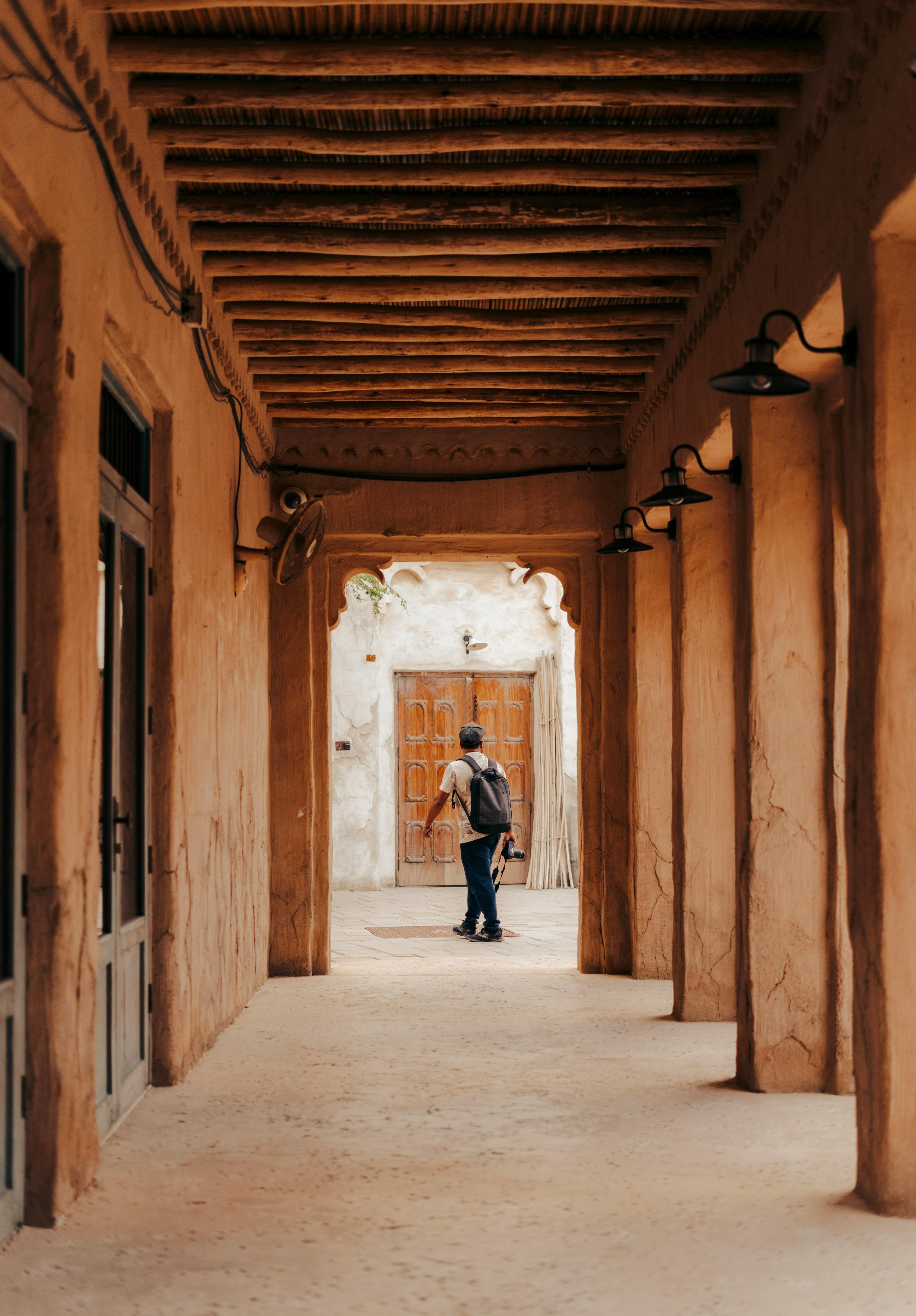 Man behind Damaged Building Columns · Free Stock Photo