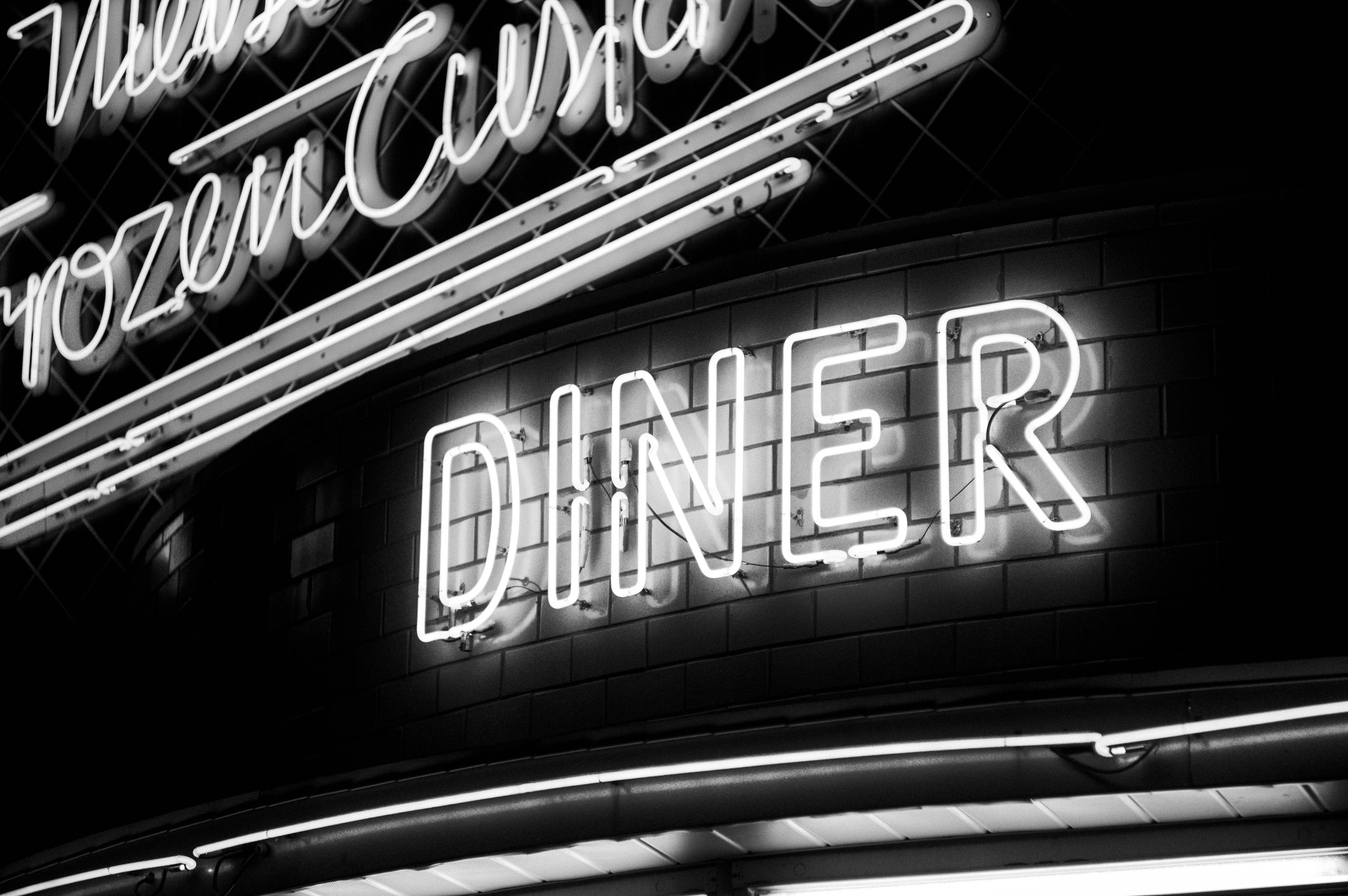 Grayscale Photo of a Neon Signage · Free Stock Photo