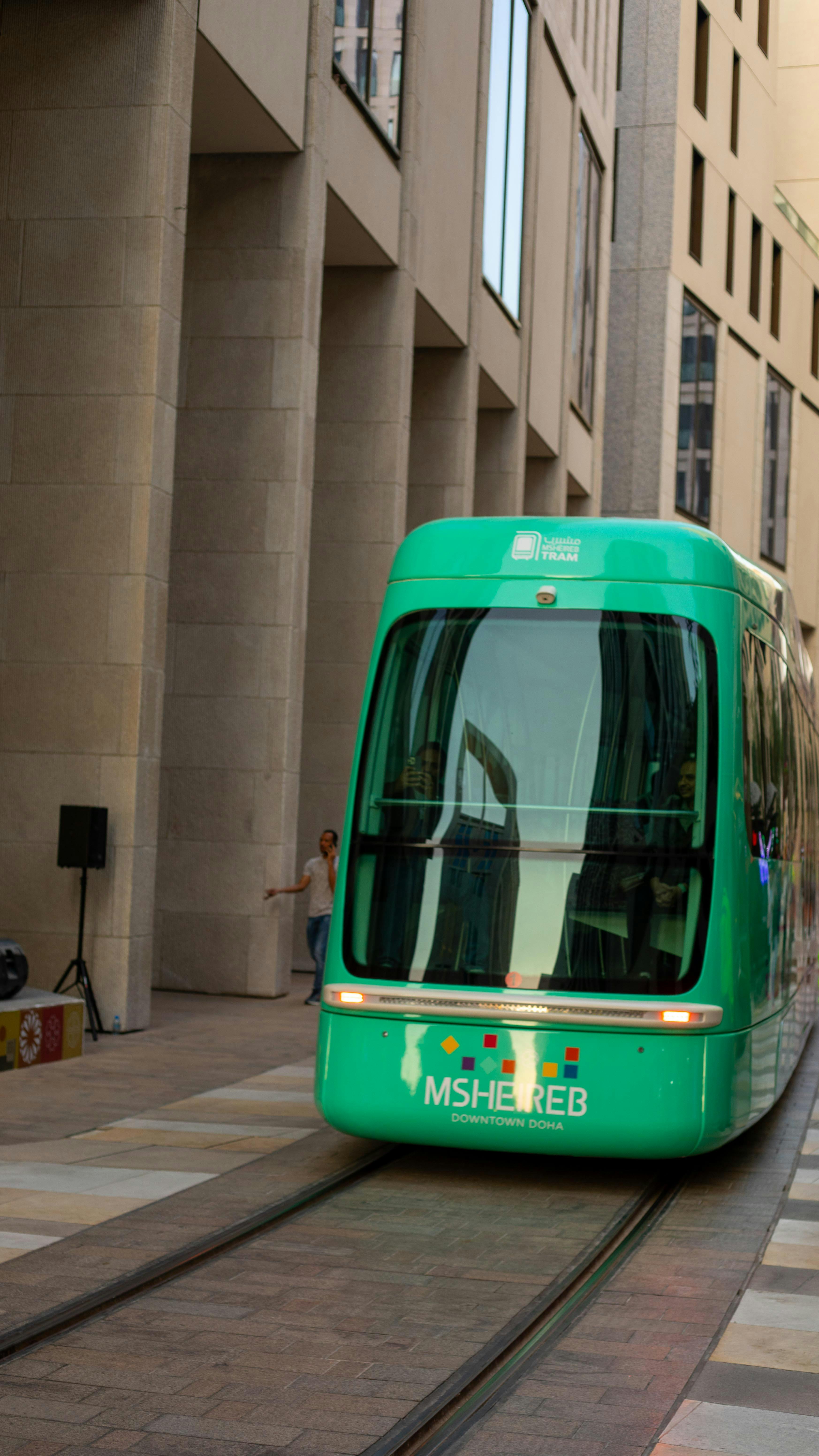 Green Tram in Town · Free Stock Photo