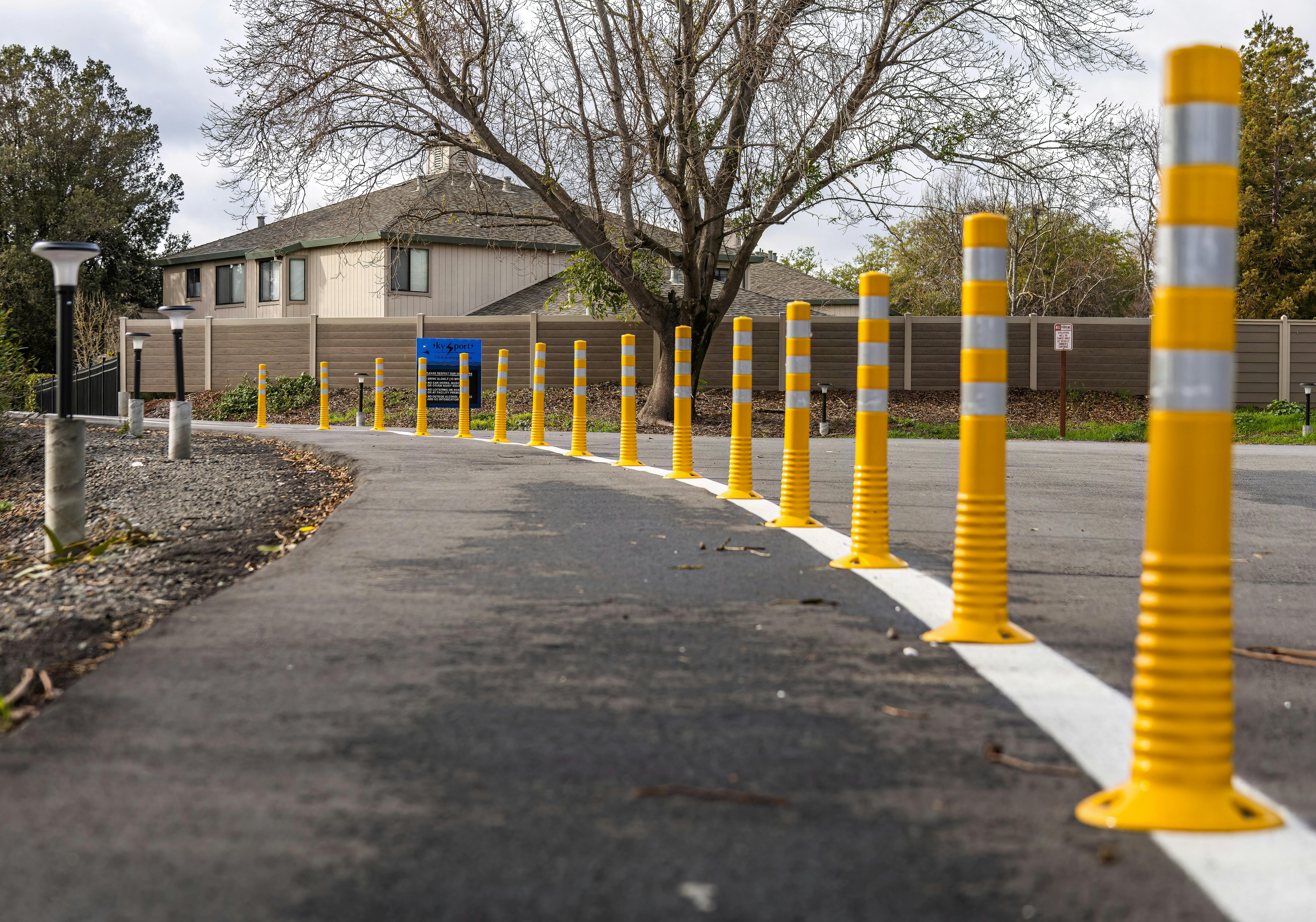 Posts on Asphalt in Town · Free Stock Photo