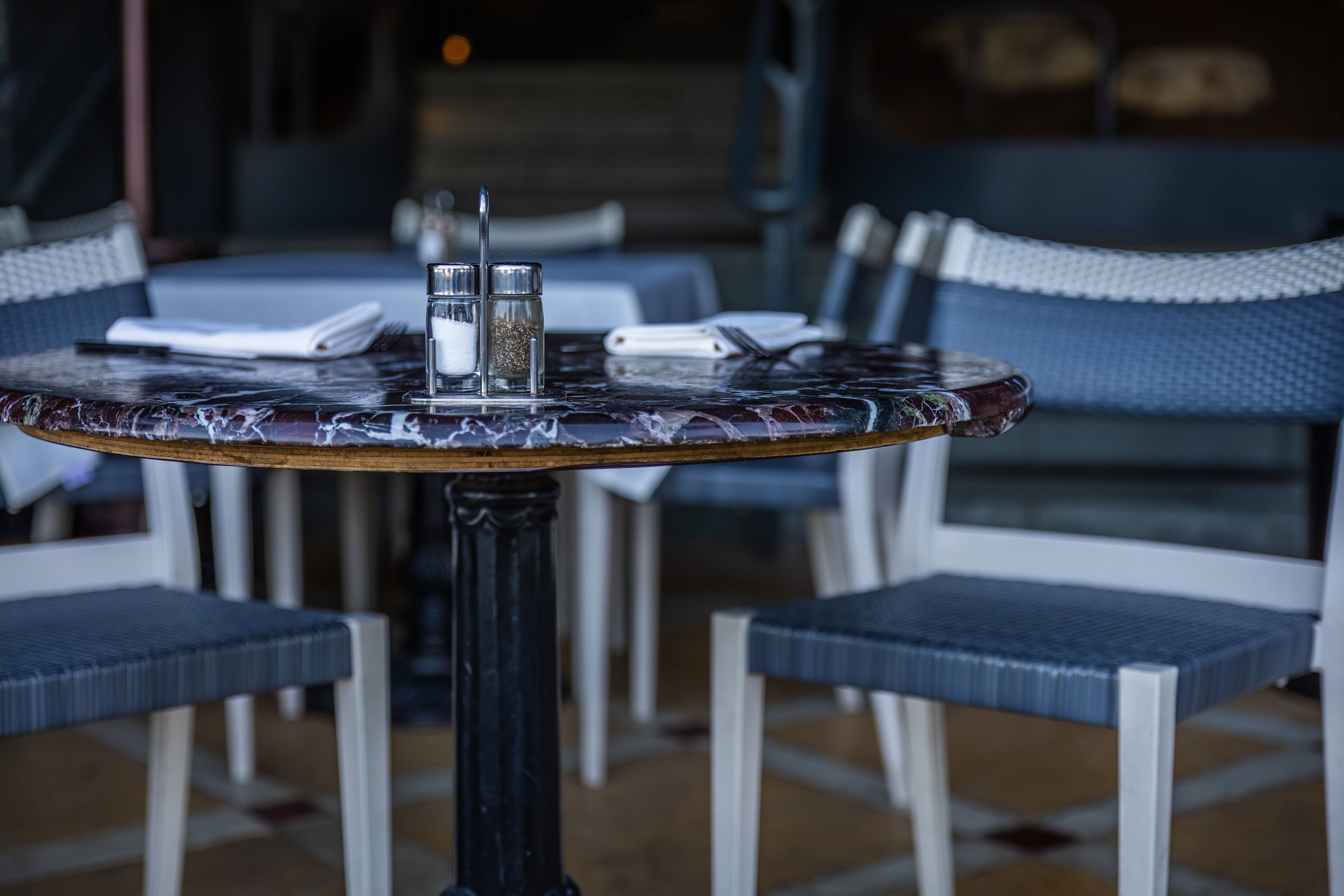 Condiments over the Marble Top Table · Free Stock Photo