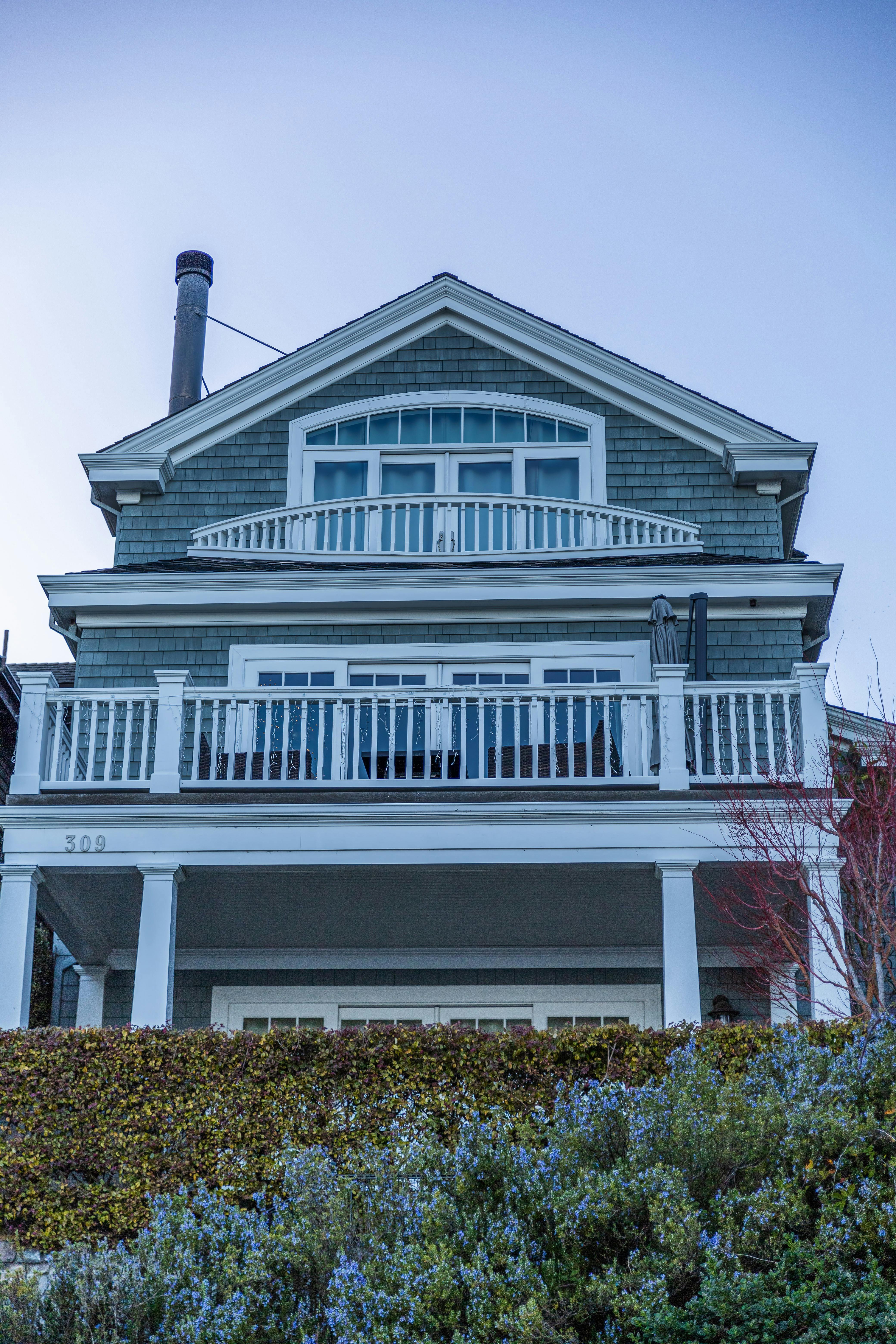 Clear Sky over House with Balcony · Free Stock Photo