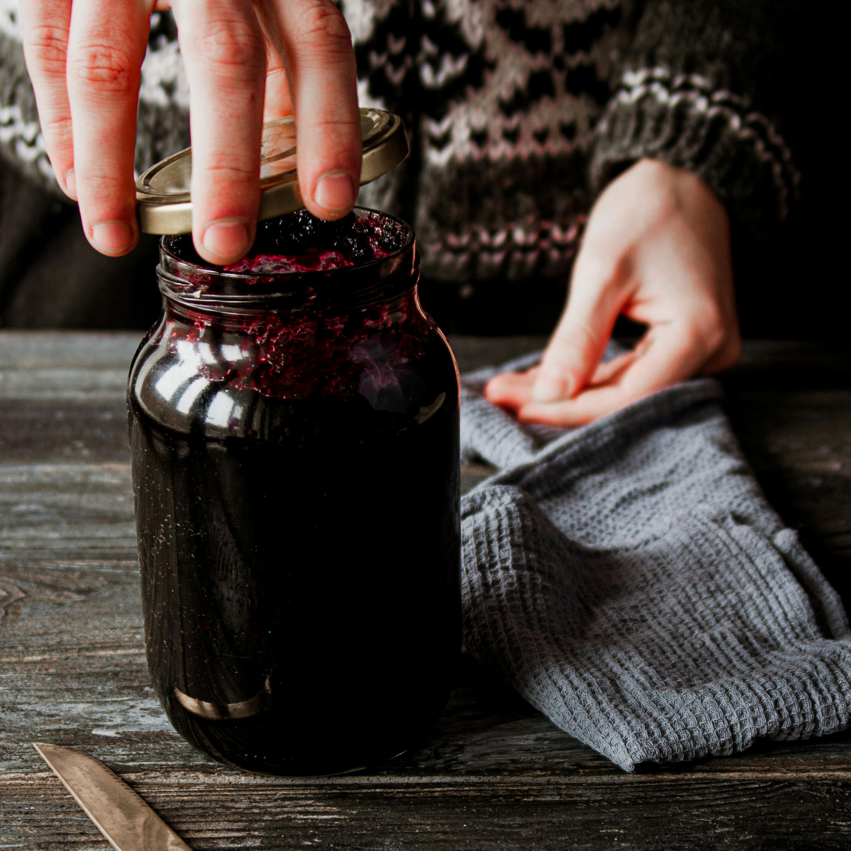 Hand Closing Jar with Jam · Free Stock Photo